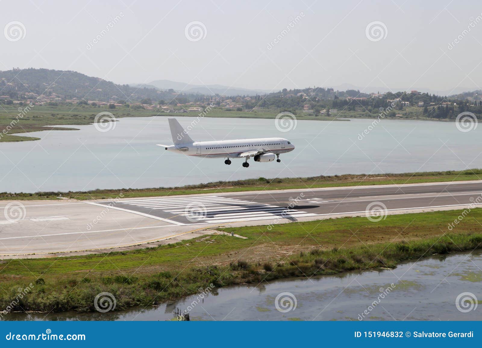 Airplane Landing on a Runway Stock Photo - Image of aircraft, tourism ...