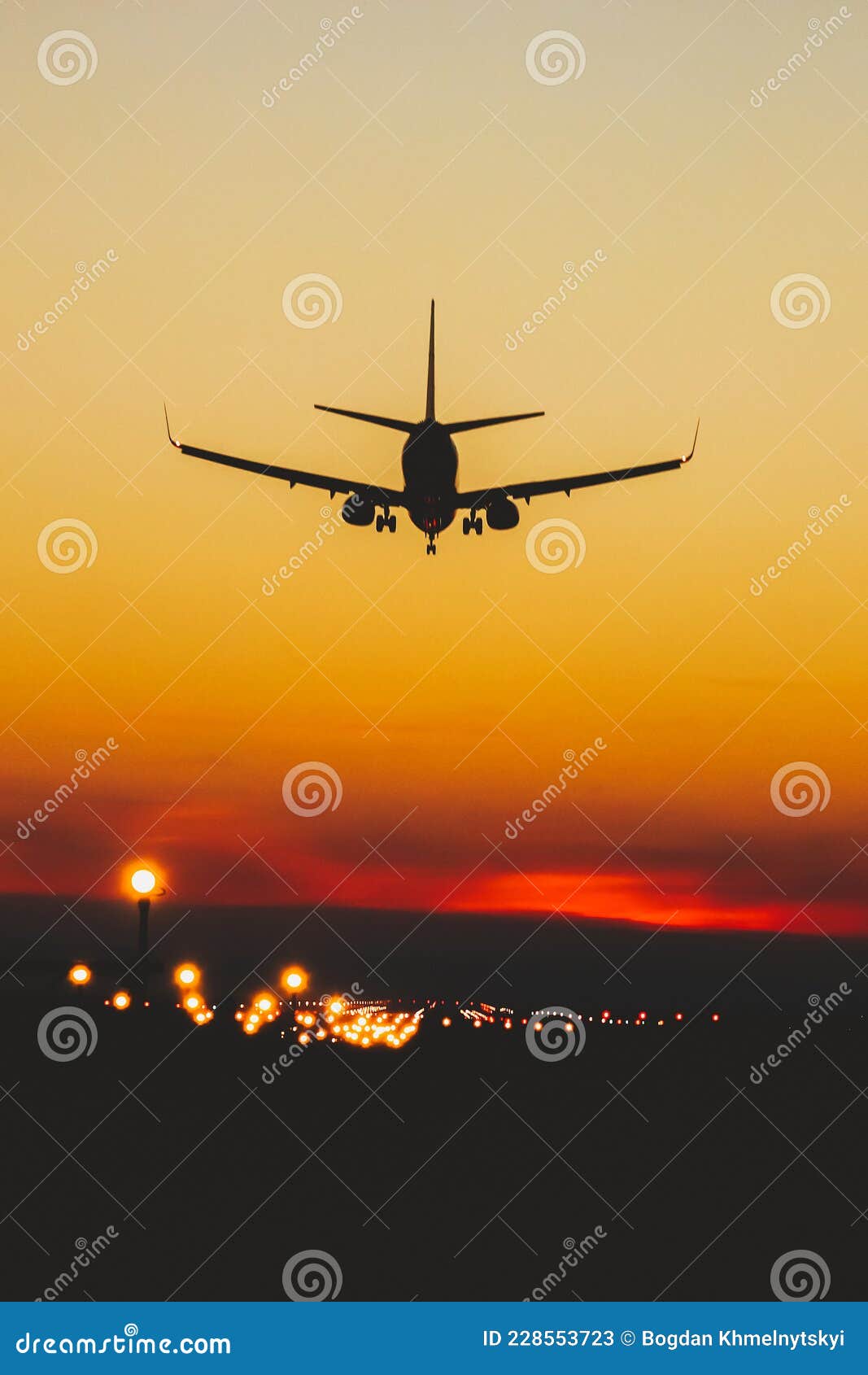Airplane Landing on the Runway during Sunset and Night Stock Image ...