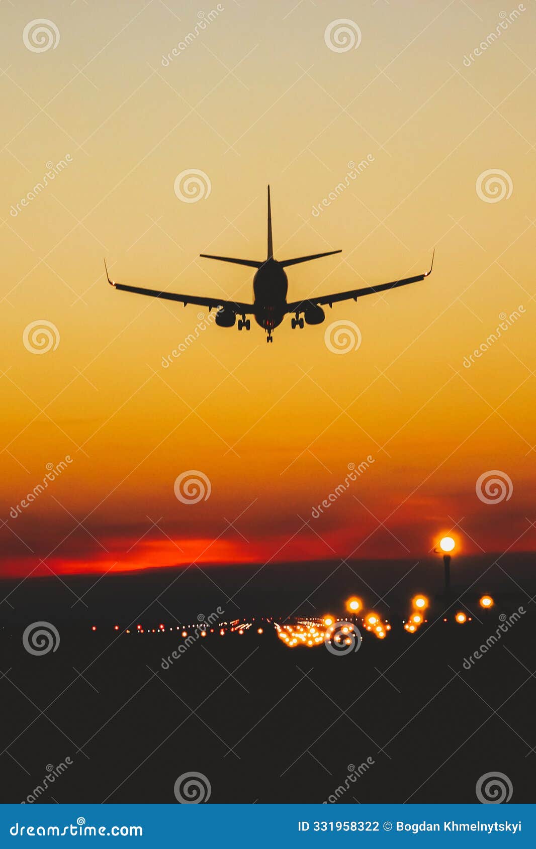 Airplane Landing on the Runway during Sunset and Night Stock Photo ...