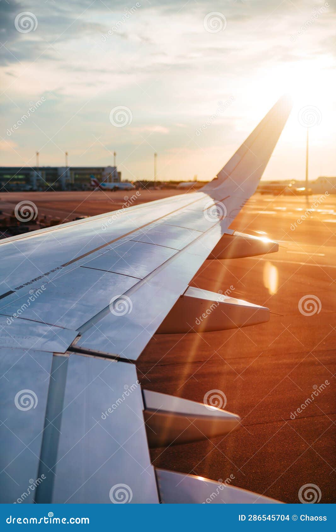 Airplane in Landing Runway at Sunset Light Stock Photo - Image of ...