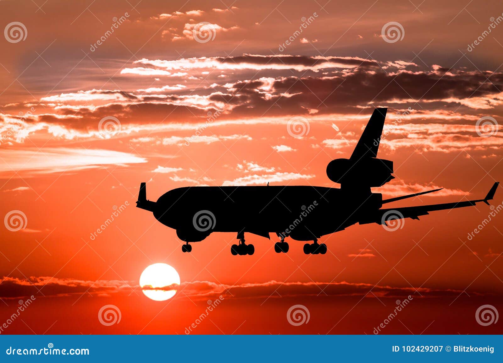 Airplane landing at sunset stock image. Image of transport - 102429207