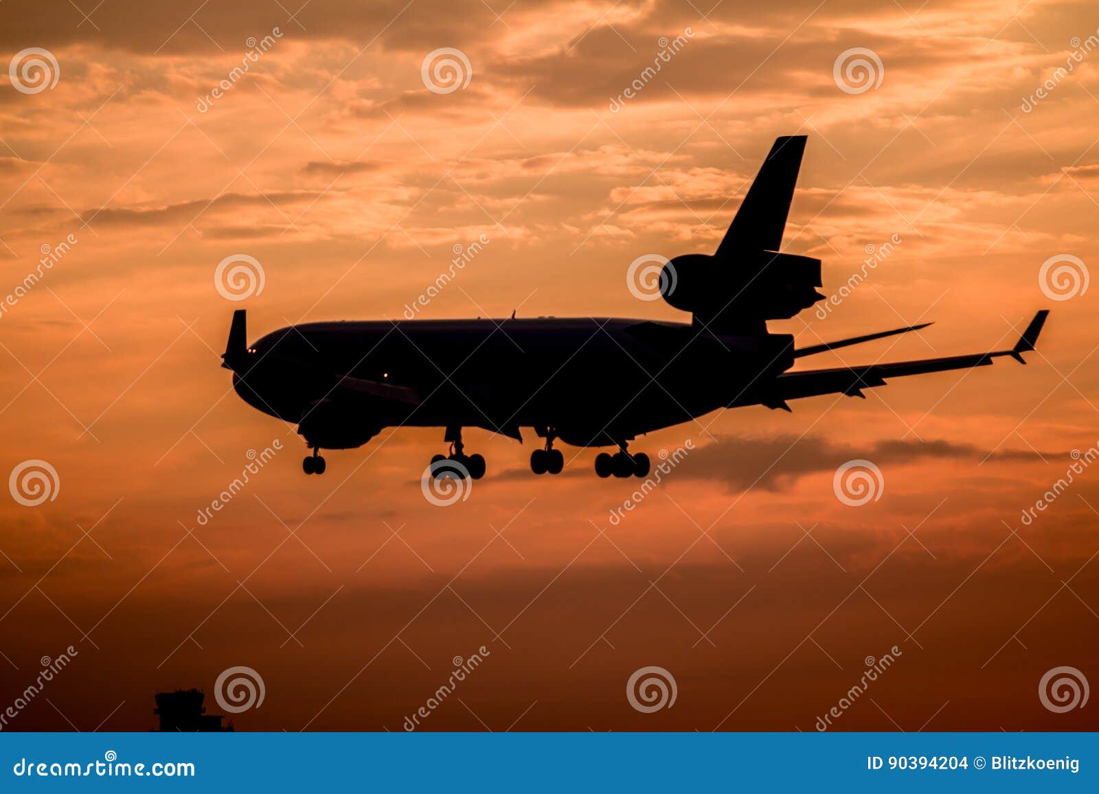 Airplane landing at sunset stock photo. Image of cockpit - 90394204