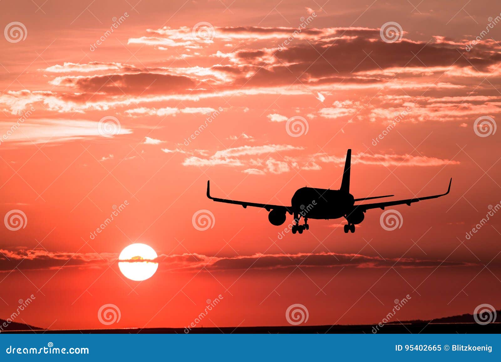 Airplane landing at sunset stock image. Image of speed - 95402665