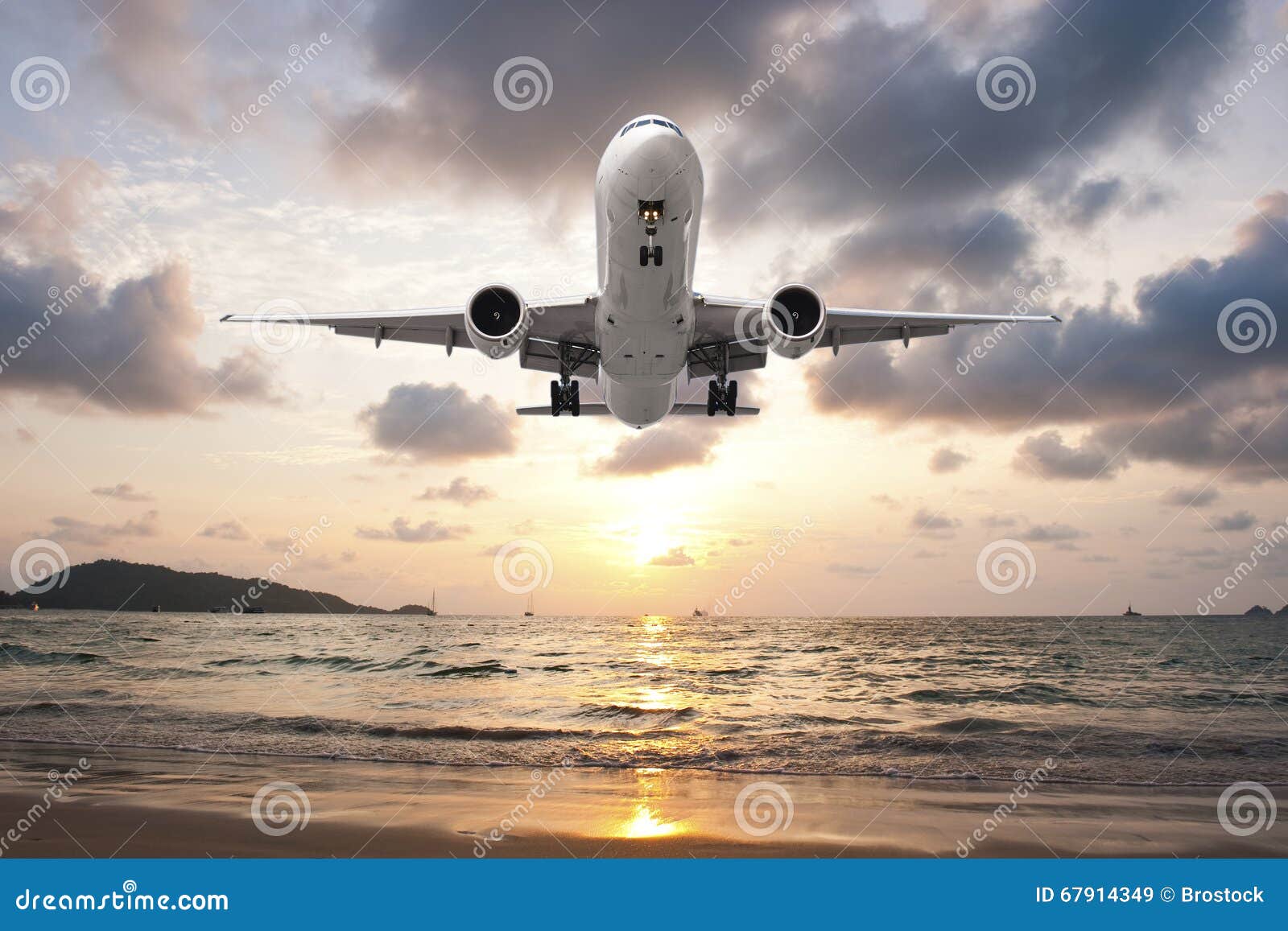 Airplane Landing in sunset stock image. Image of touching - 67914349