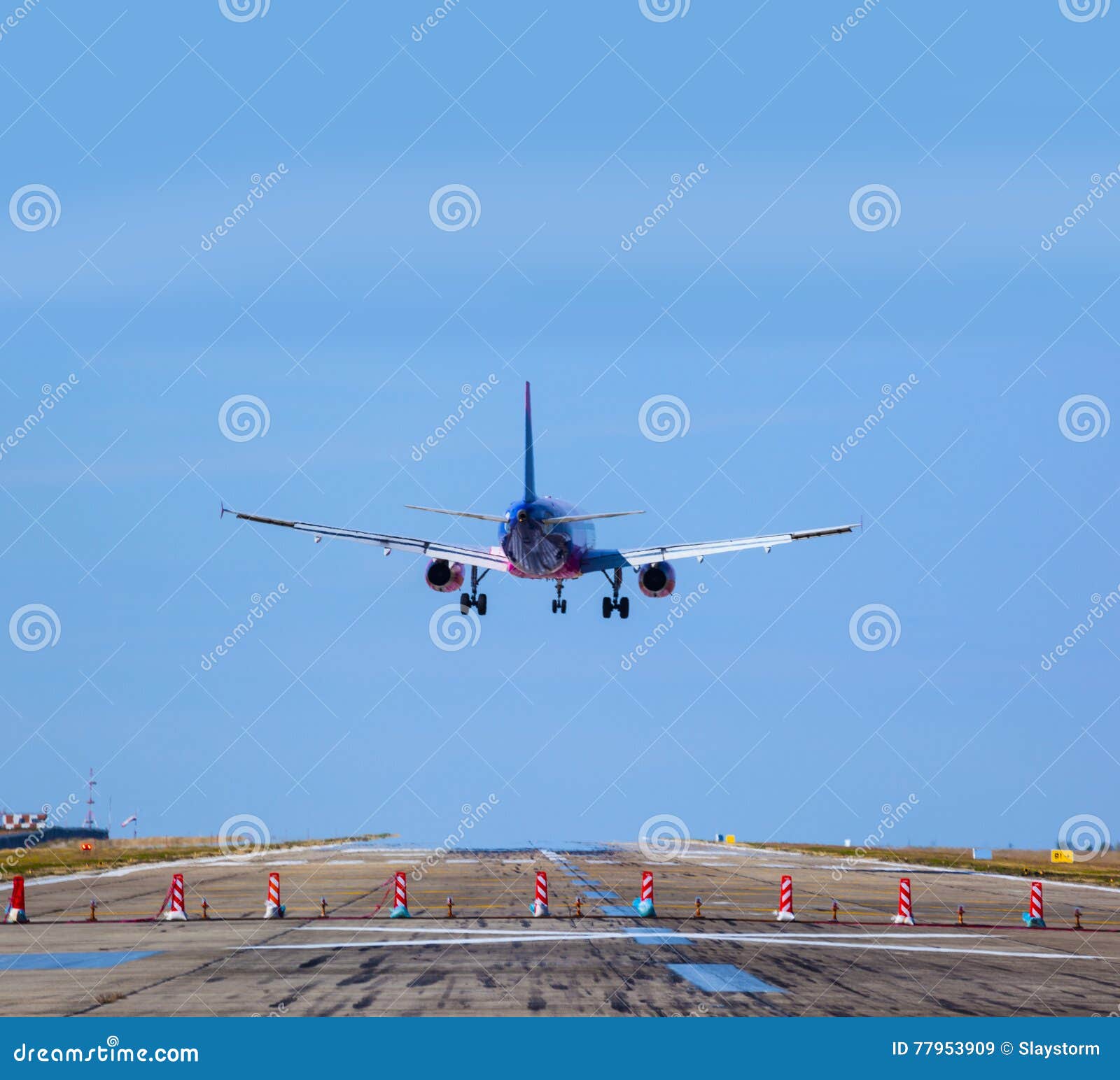 Airplane landing to runway stock image. Image of airport - 77953909