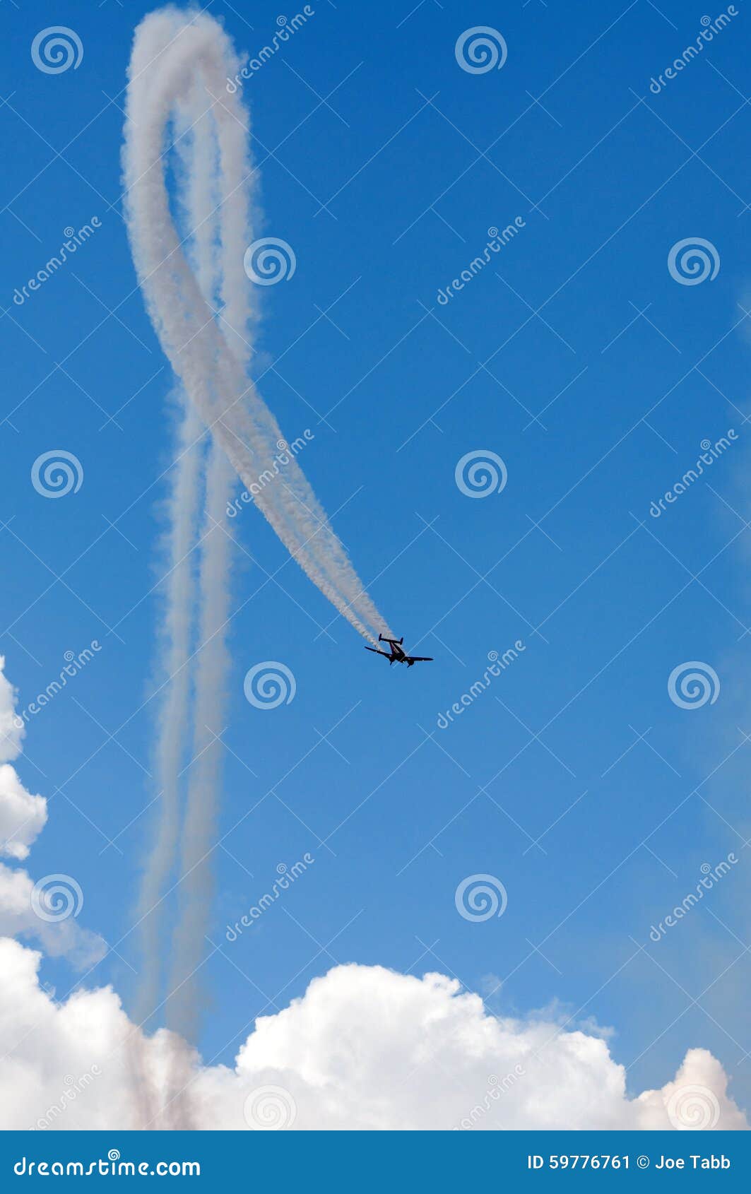Airplane loop stock image. Image of plane, trail, twin - 59776761