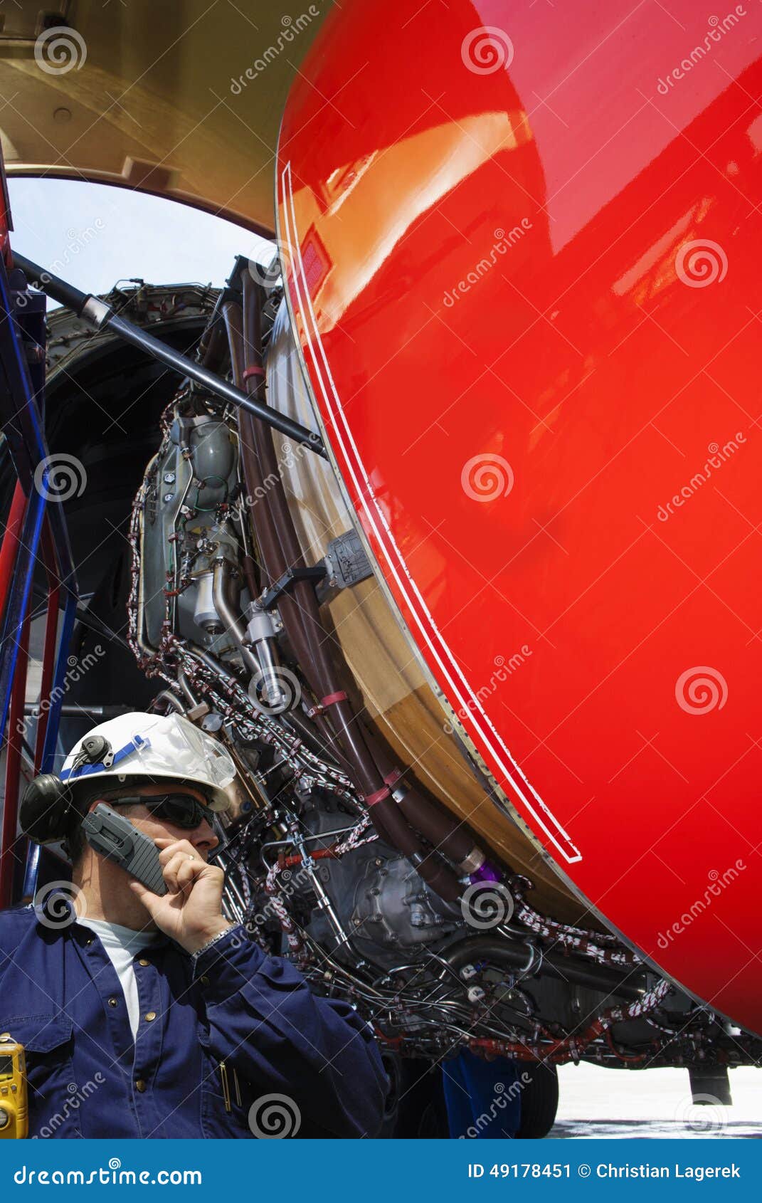Airplane Mechanic Inspecting Jet Engine Stock Image - Image of ...