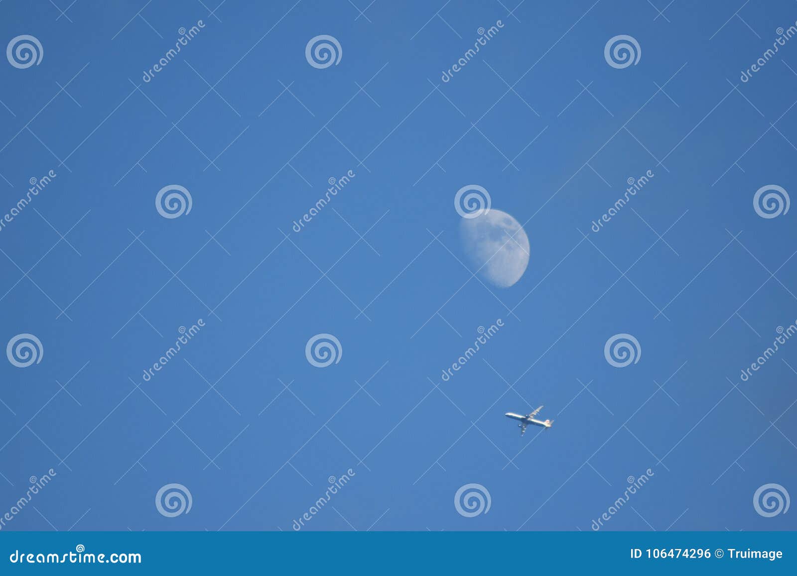 Airplane meets the moon stock photo. Image of plane - 106474296