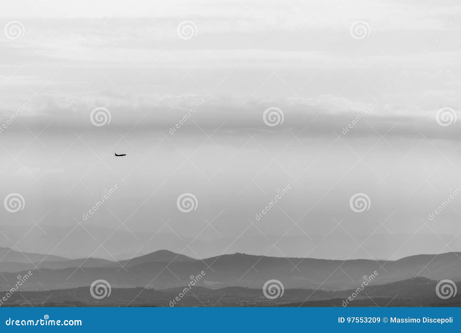 Airplane and misty hills stock image. Image of atmosphere - 97553209