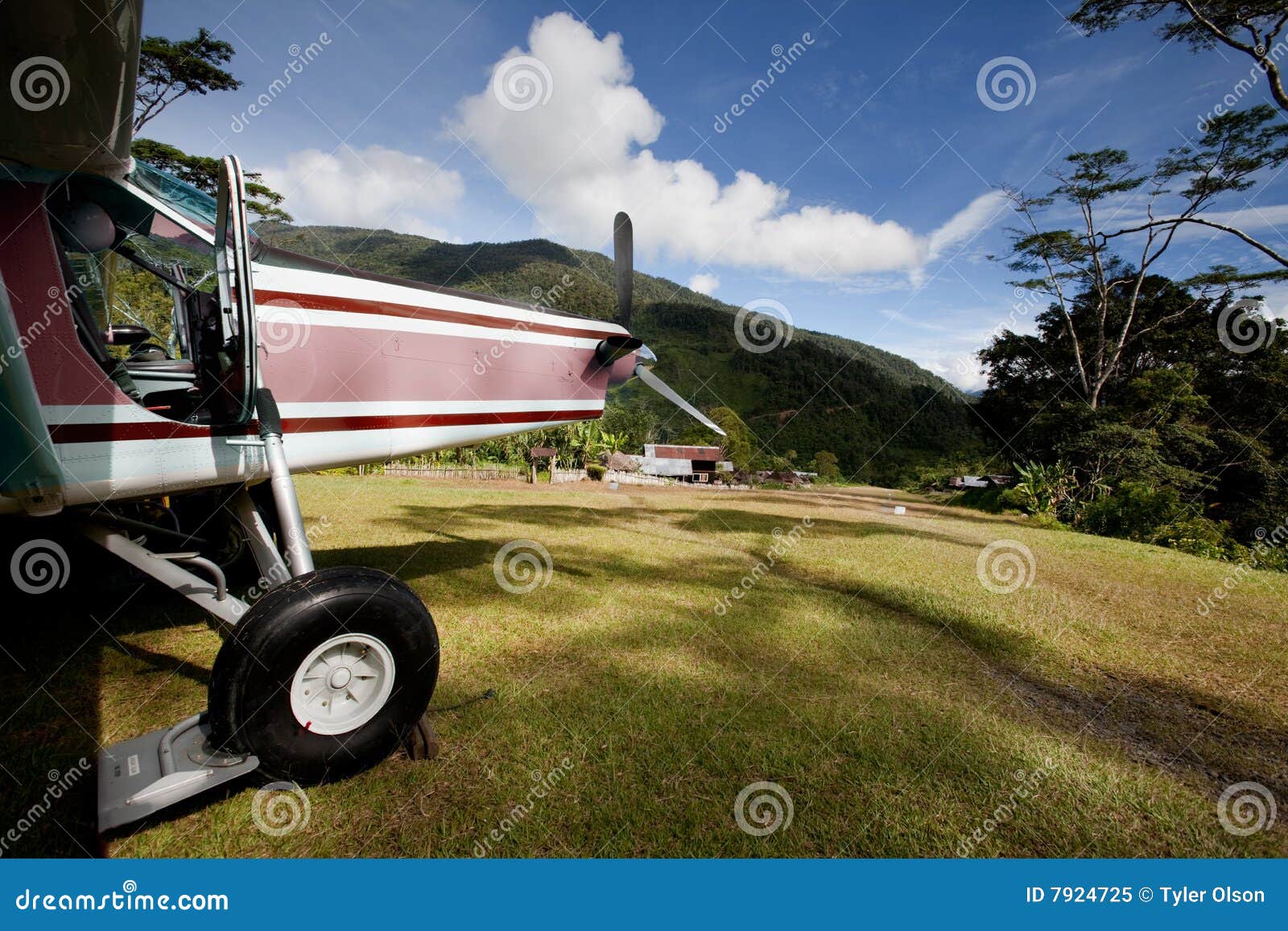 Airplane on Mountain Runway Stock Image - Image of mountain, single ...