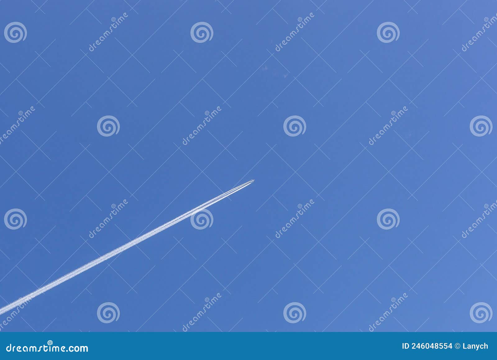 An Airplane Moving Over the Blue Sky Background Stock Photo - Image of ...