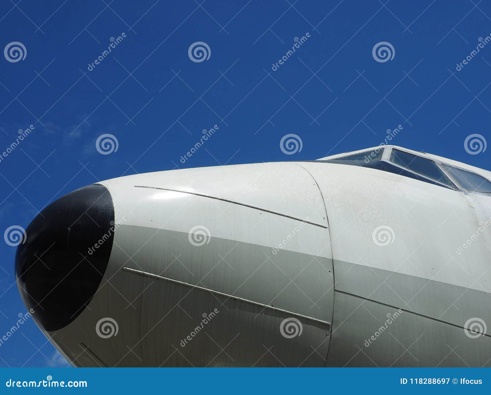 Airplane nose in blue sky stock image. Image of outside - 118288697