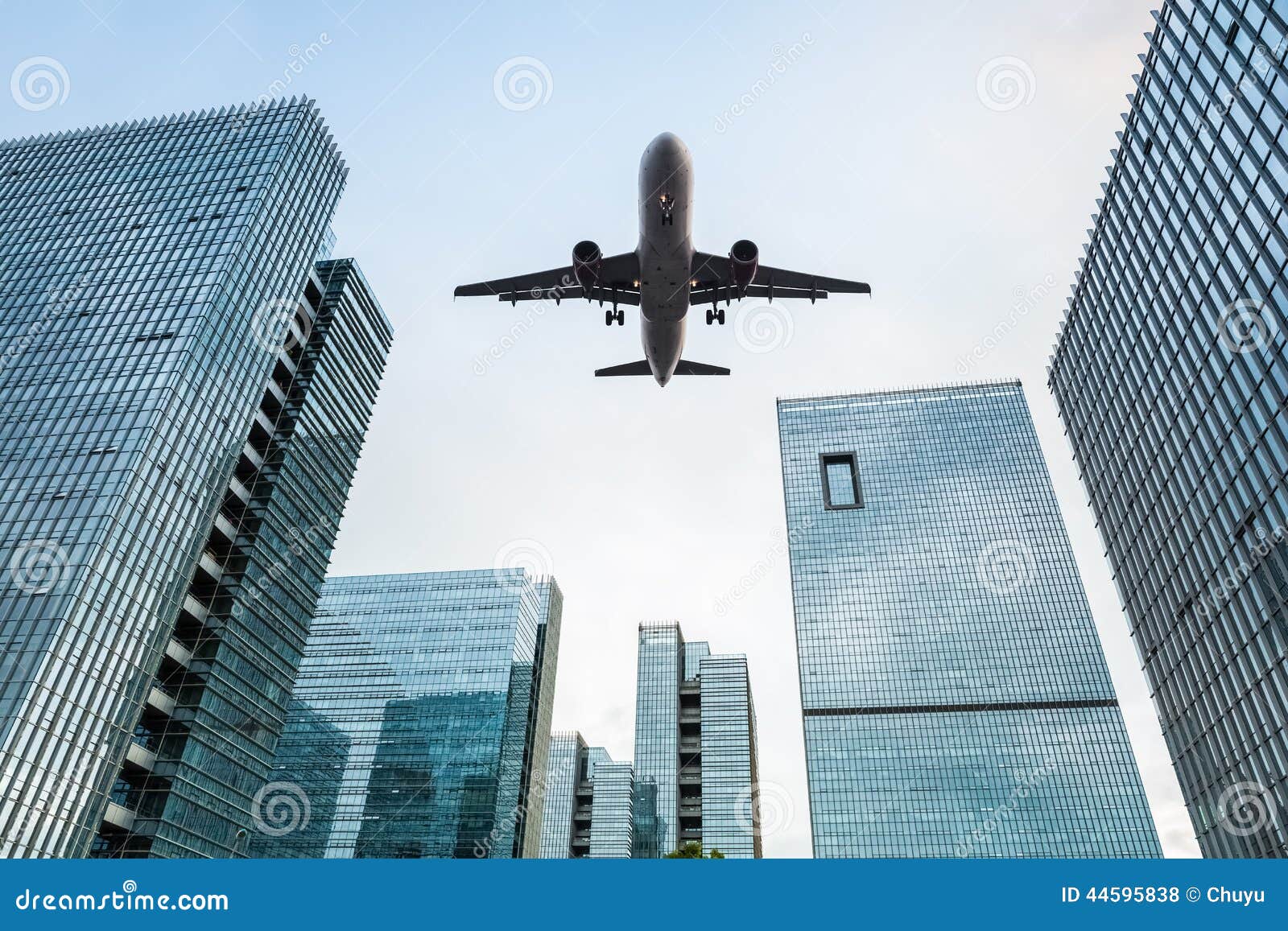 Airplane and Office Buildings Stock Photo - Image of airliner, future ...