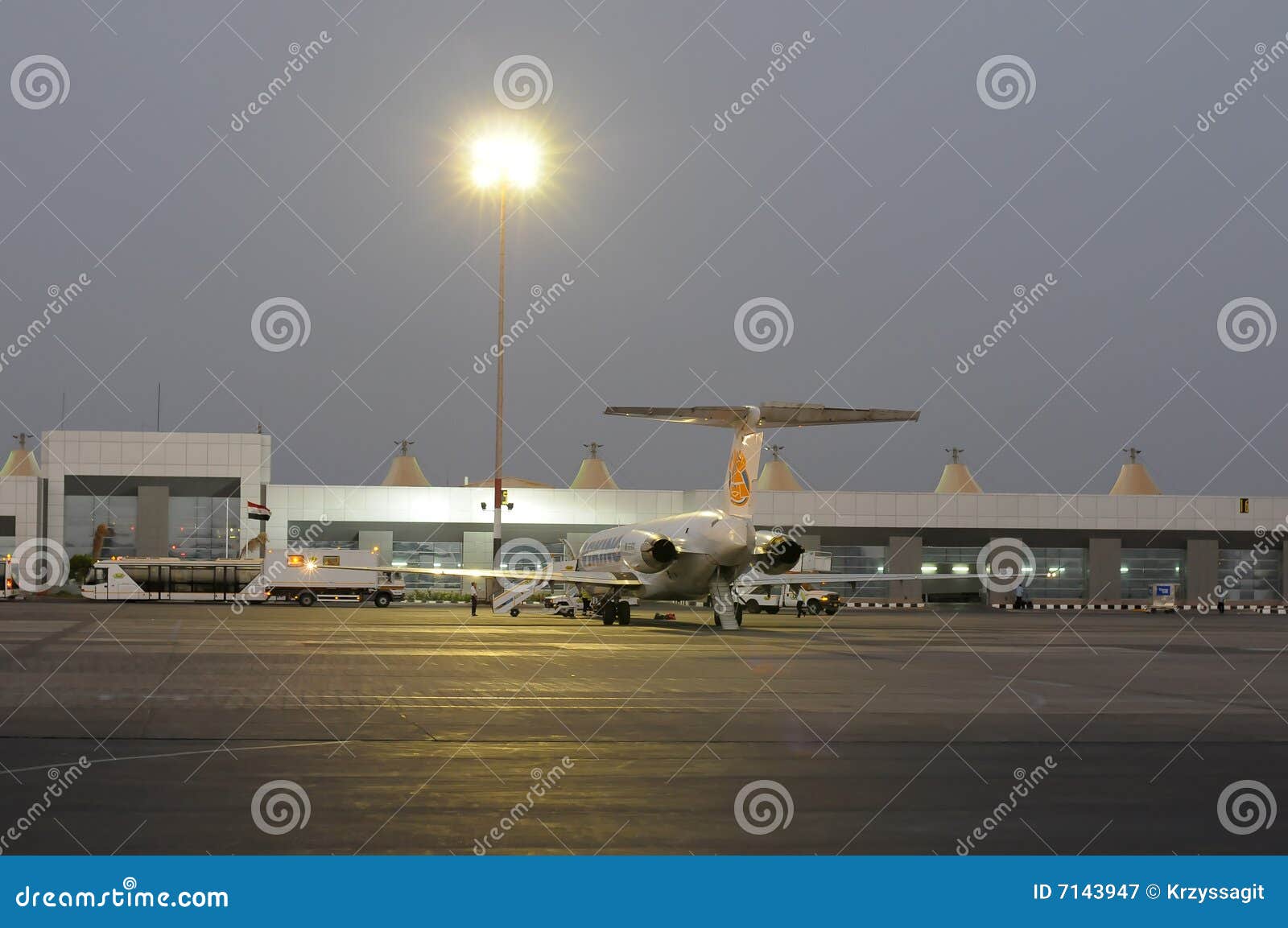 Airplane outside airport stock image. Image of grey, night - 7143947