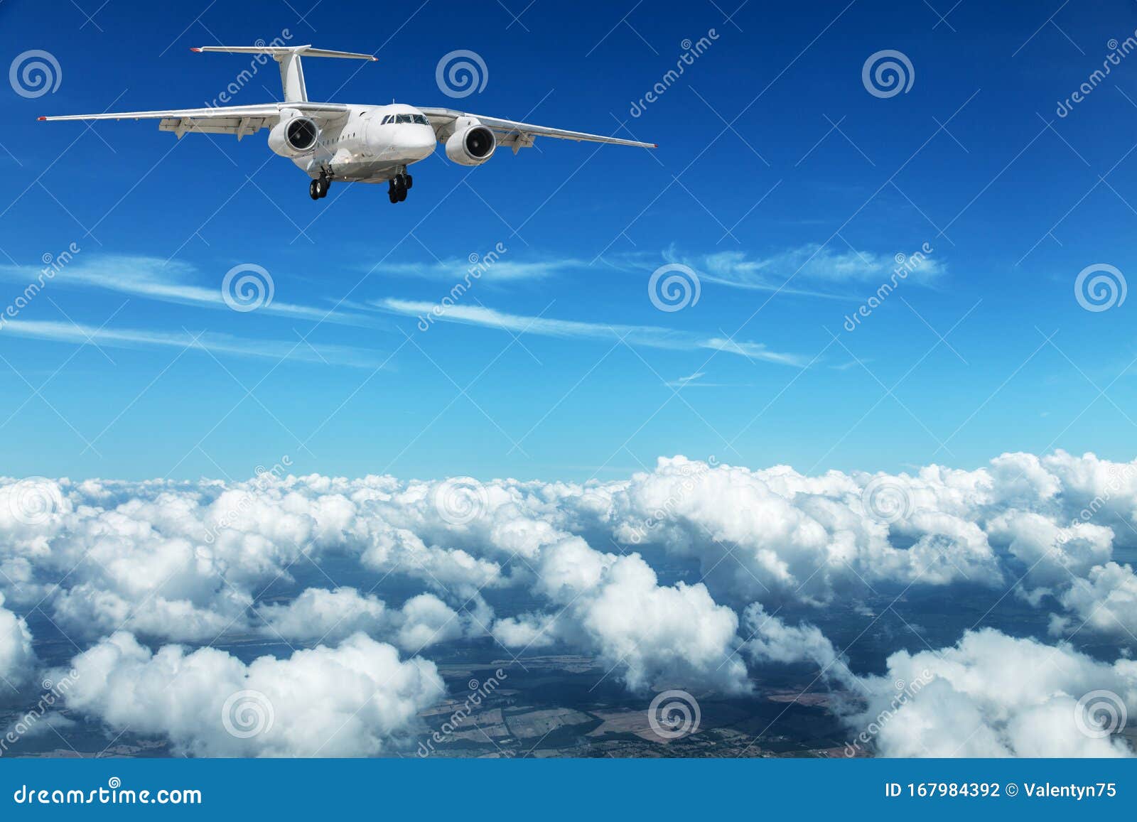 Airplane over the clouds stock photo. Image of road - 167984392