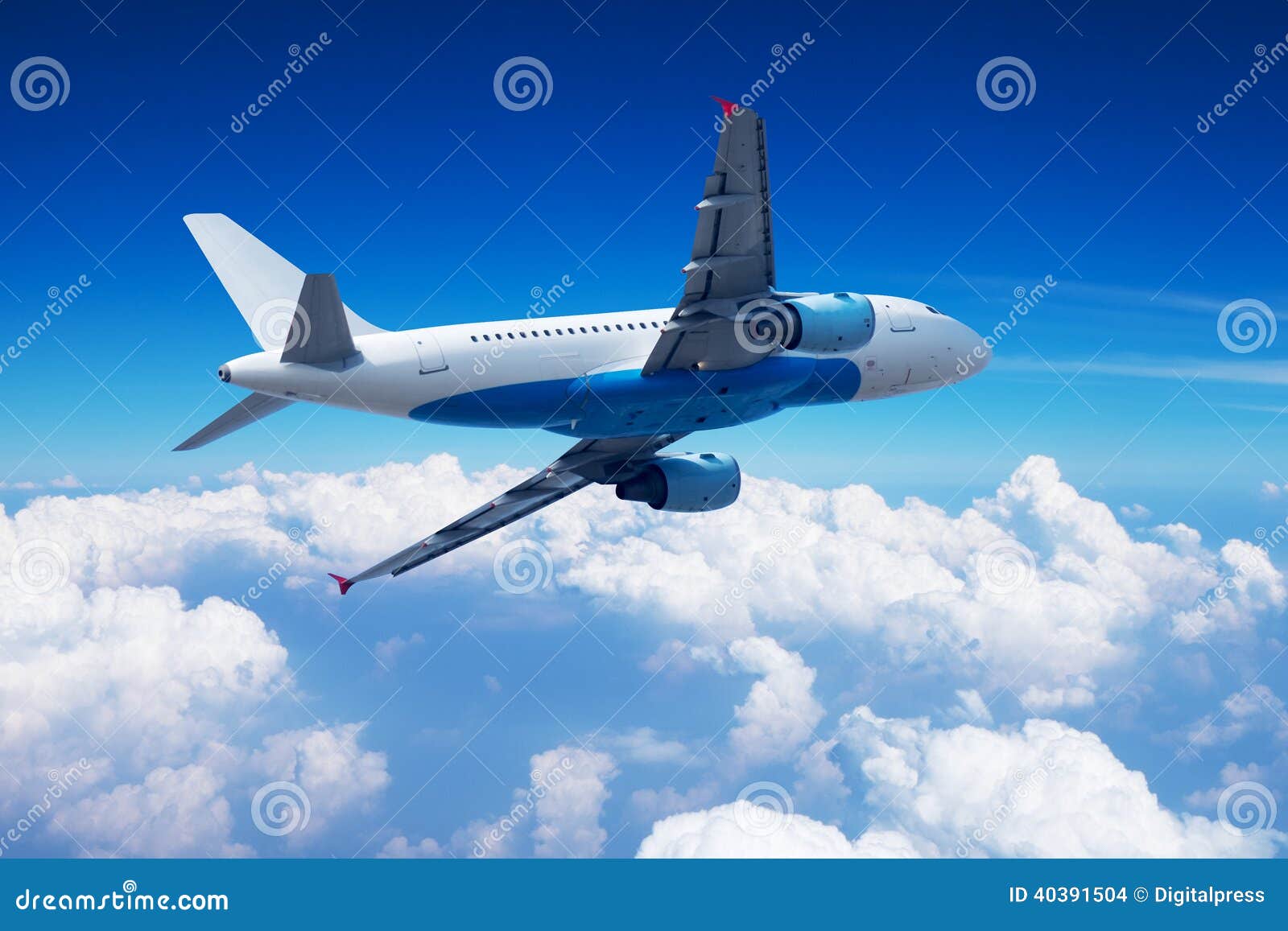Airplane over the clouds stock photo. Image of flying - 40391504