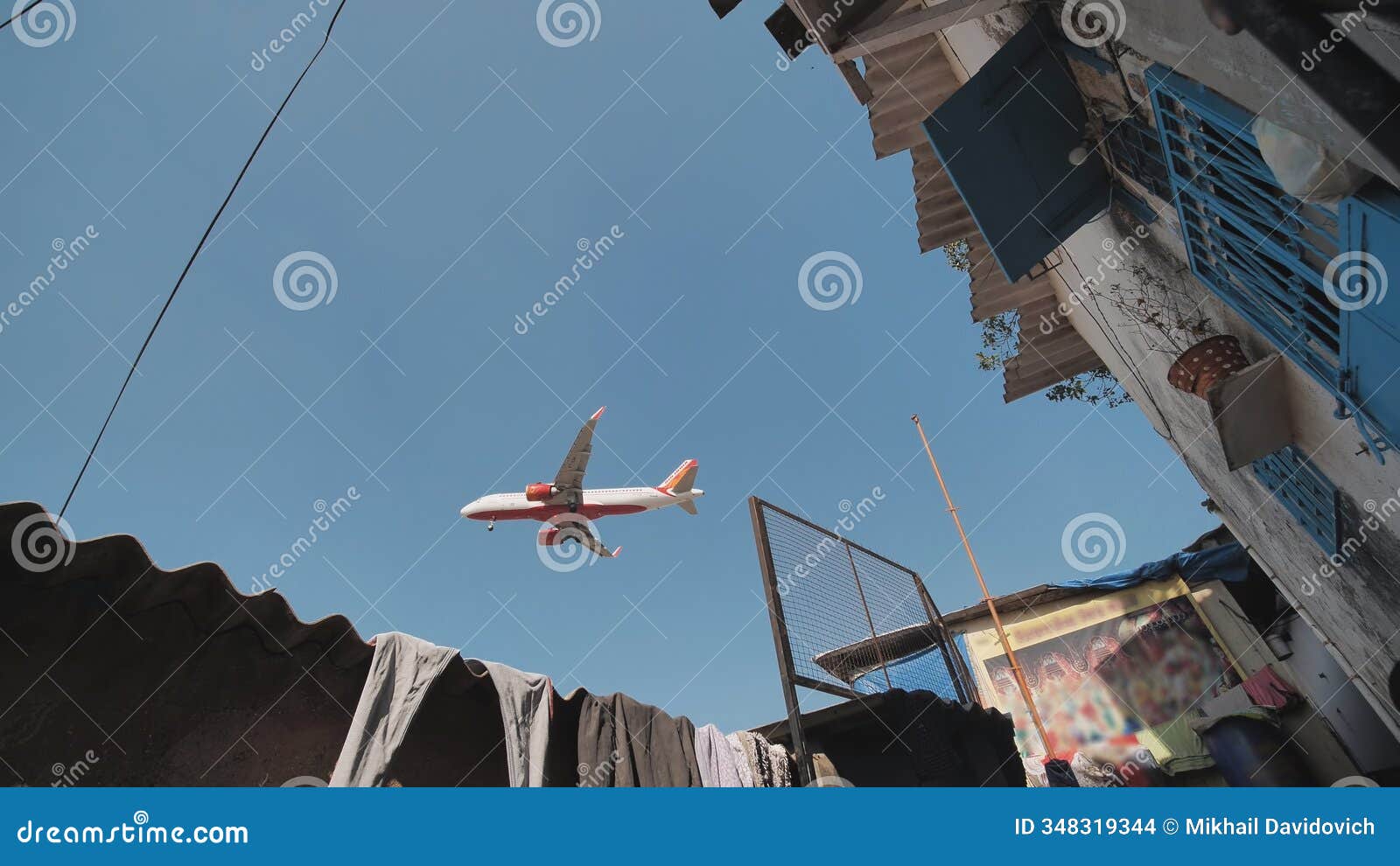 An Airplane Over the Houses in Mumbai. Stock Photo - Image of cityscape ...