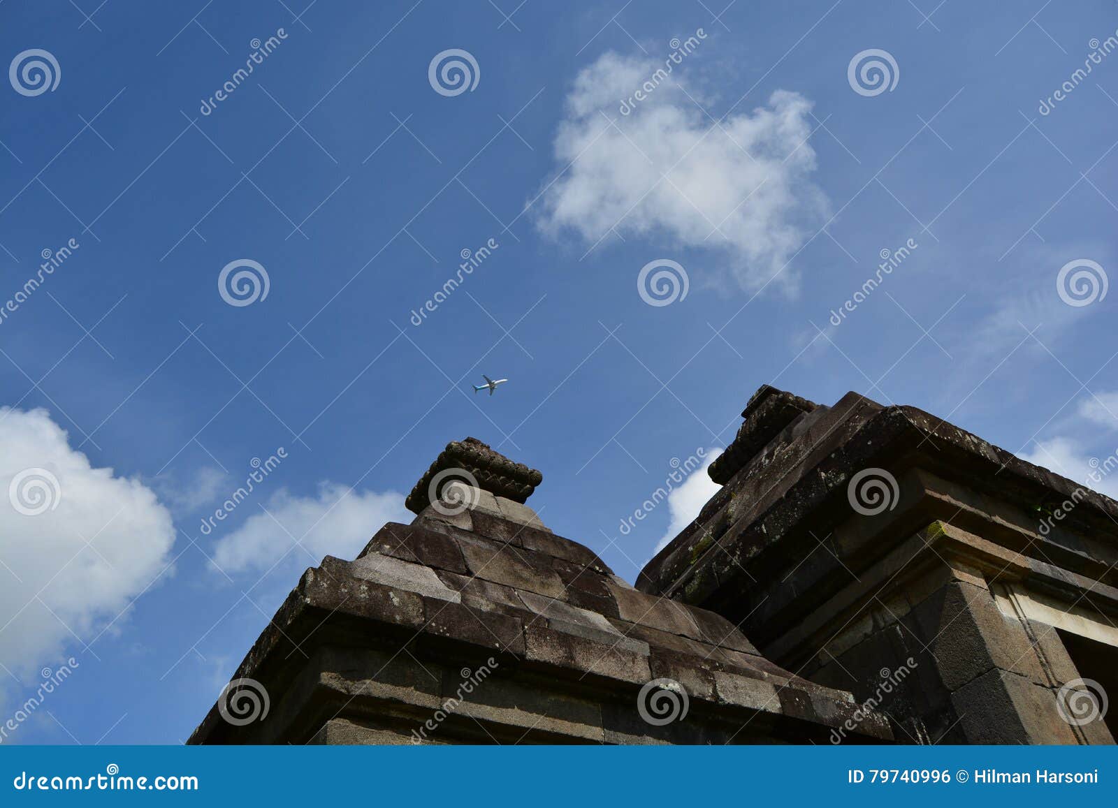Airplane over the temple stock photo. Image of pesawat - 79740996