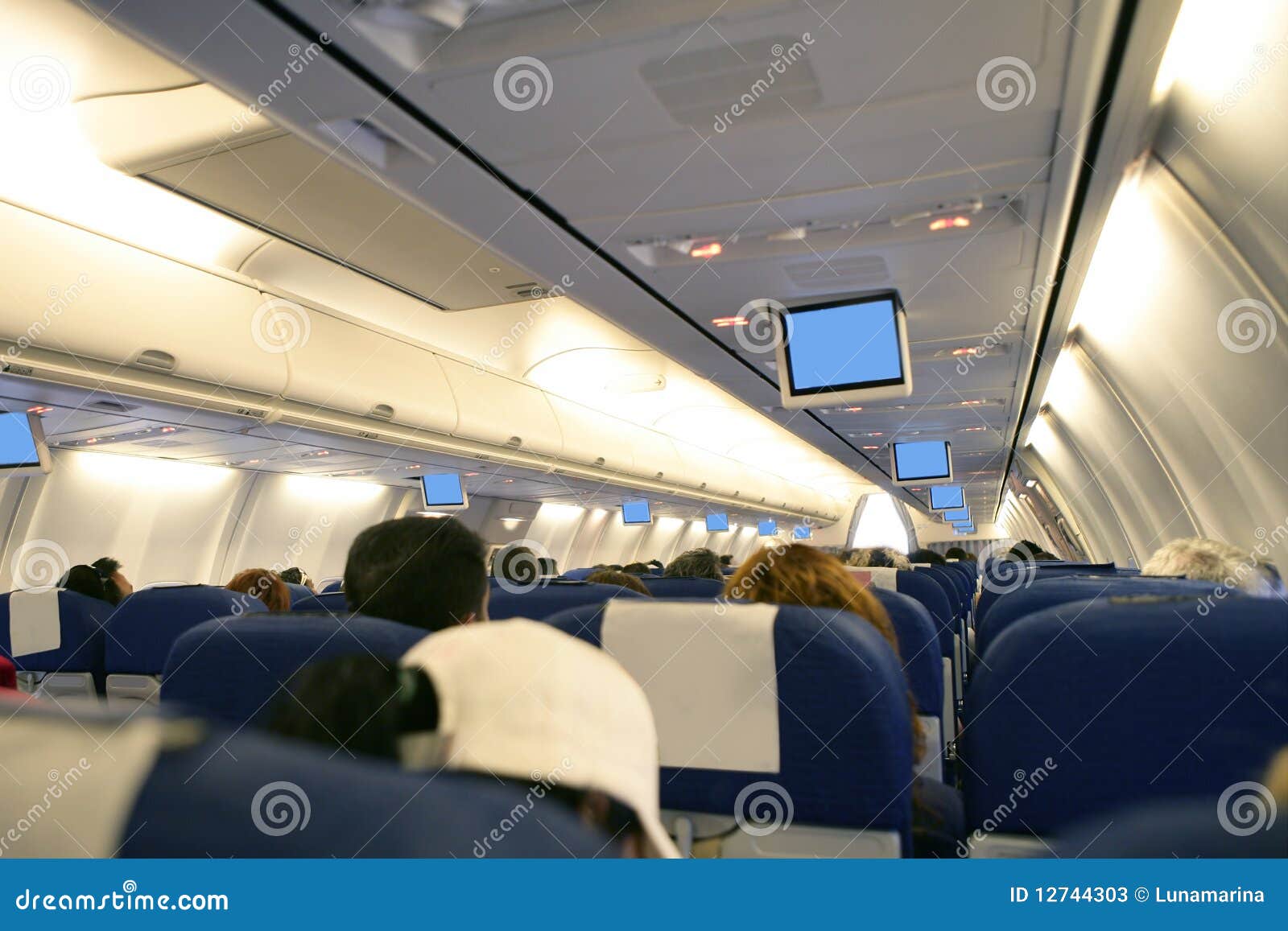 Airplane with Passengers Interior View Stock Image - Image of board ...