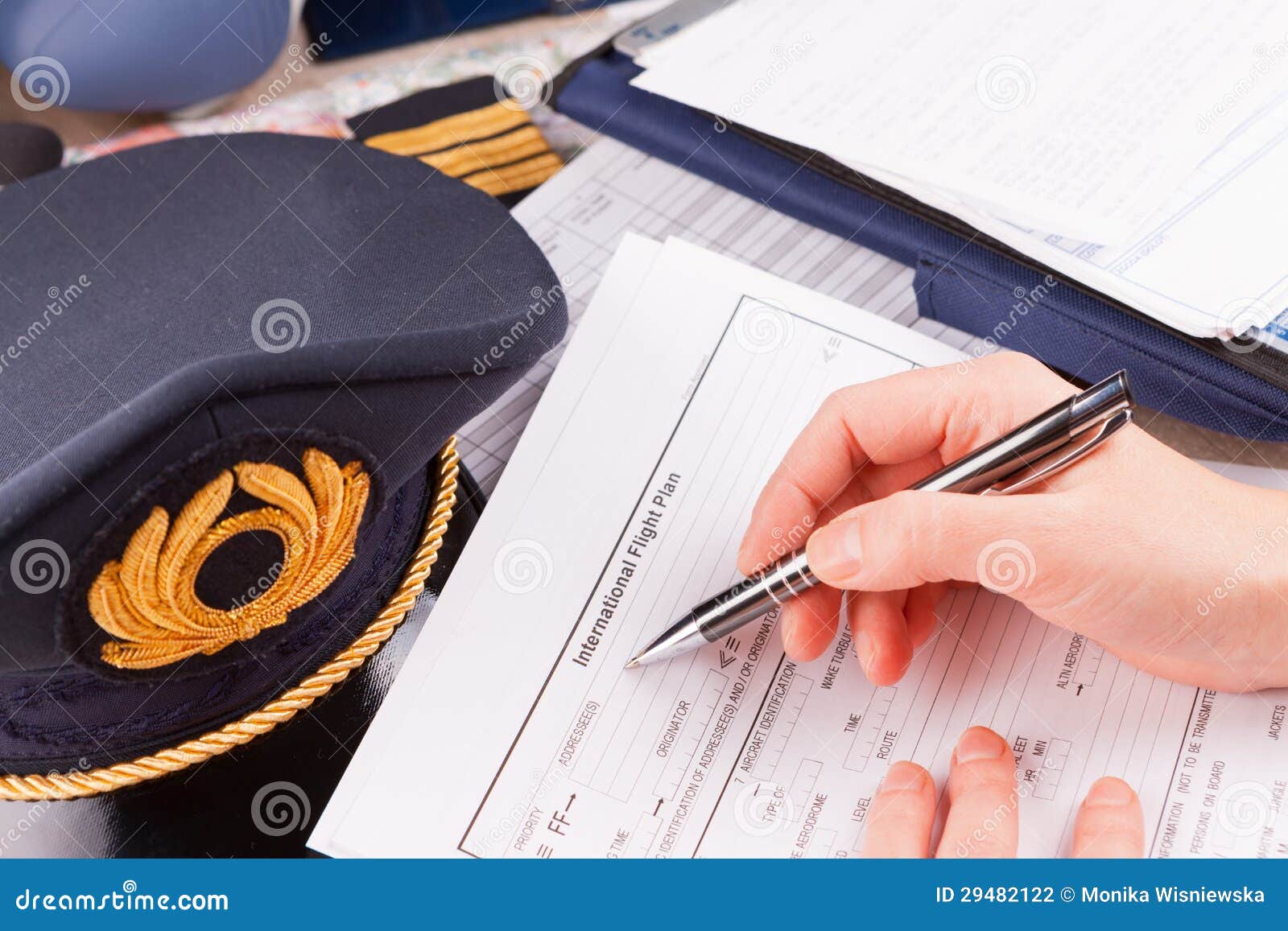 Airplane Pilot Filling in Flight Plan Stock Photo - Image of navigation ...