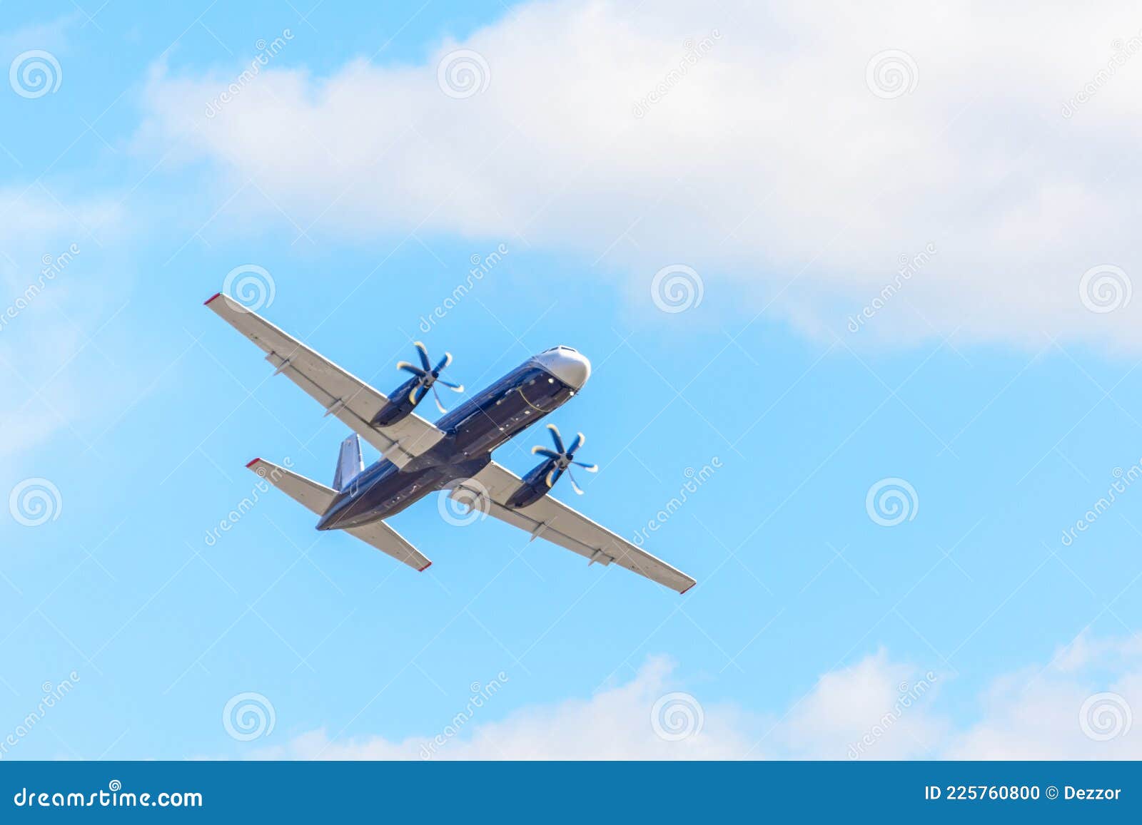 An Airplane with Propellers on Its Wings Flies in the Sky Stock Photo ...