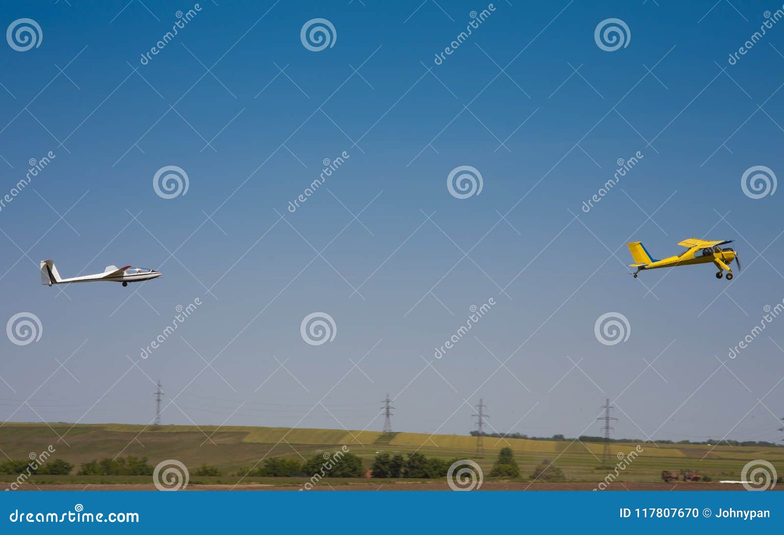Airplane pulling glider stock photo. Image of flying - 117807670