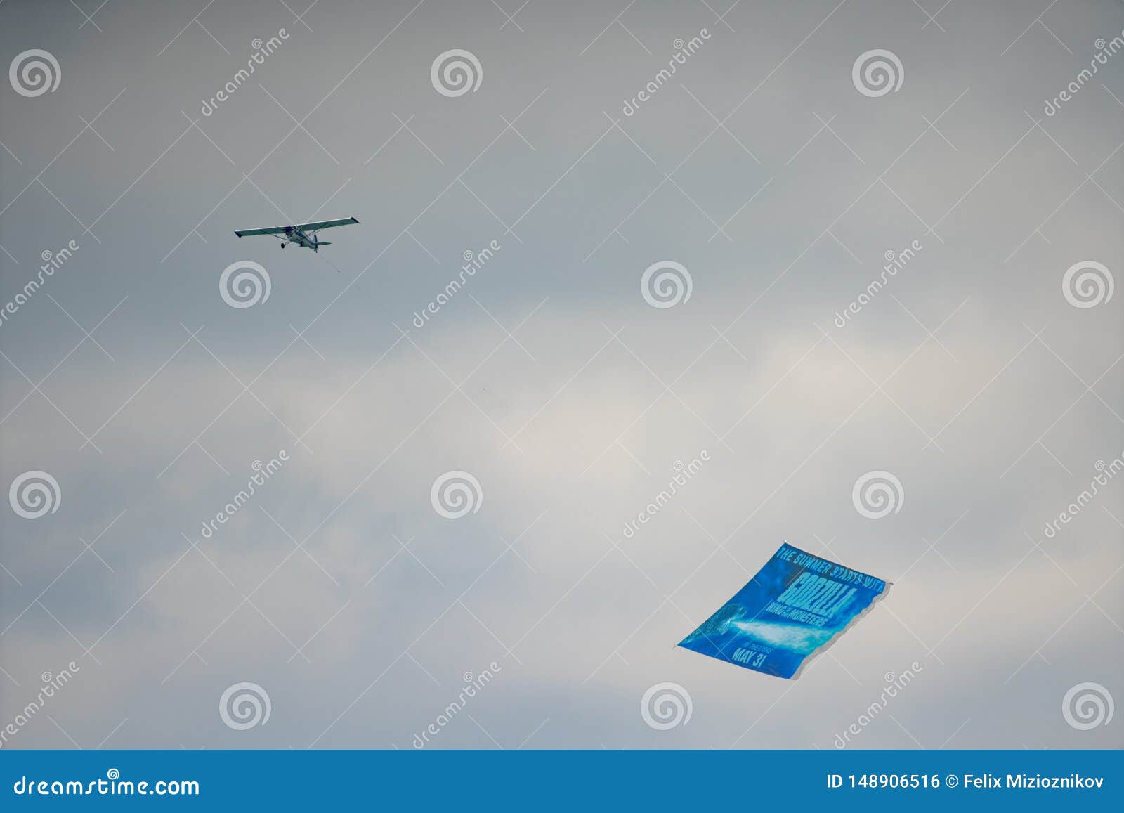 Airplane Pulling Godzilla Movie Banner In The Sky Editorial Image ...