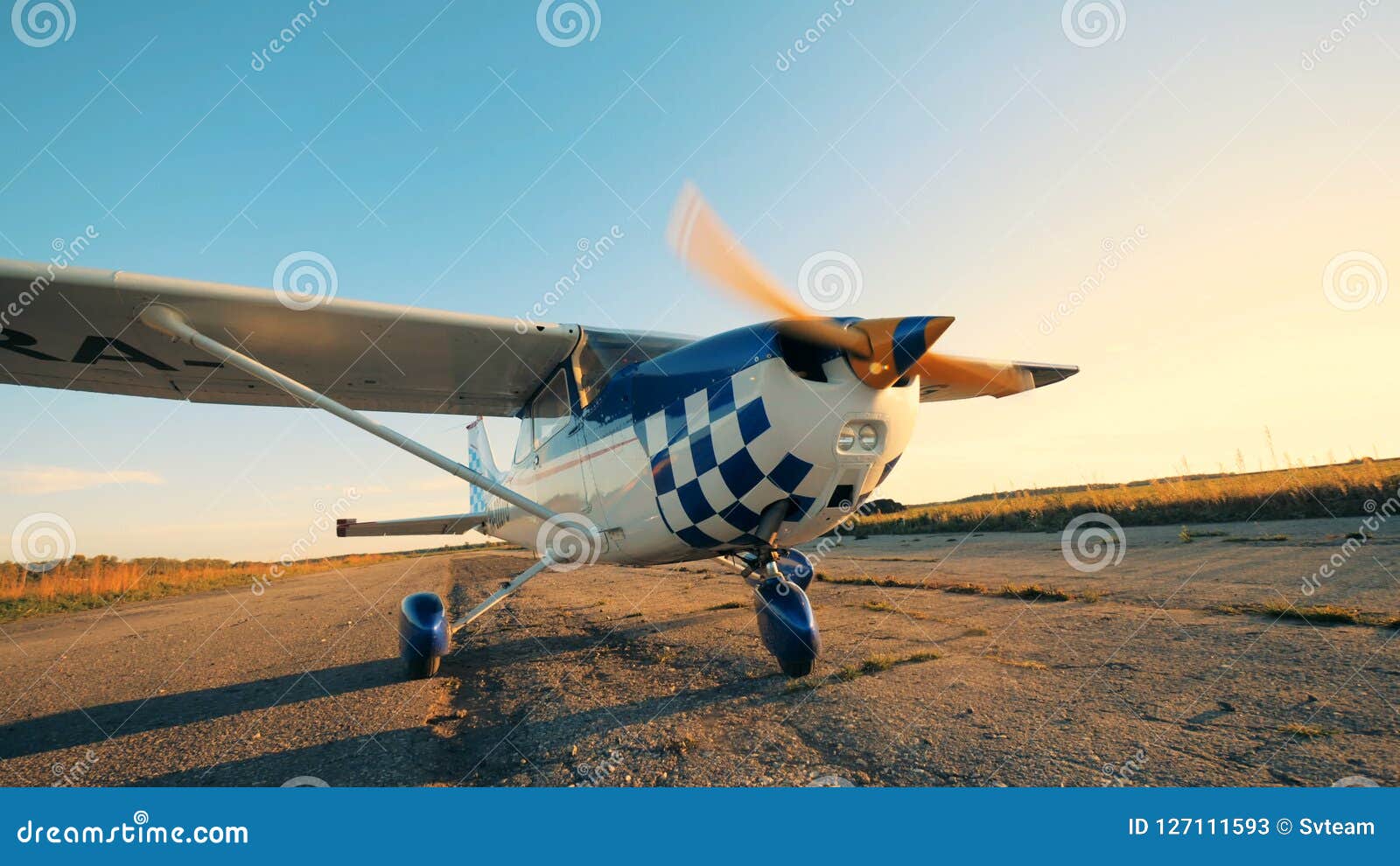 Airplane with Rotating Propeller. Working Plane Standing on a Runway ...