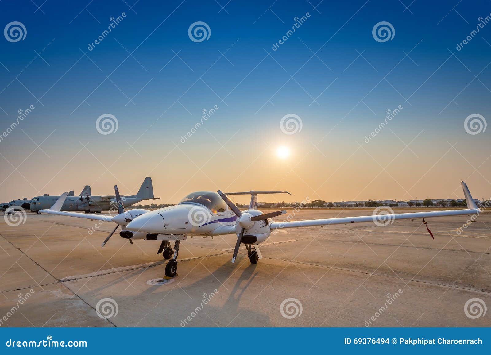 Airplane on the Runway during Sunset. Stock Photo - Image of small ...