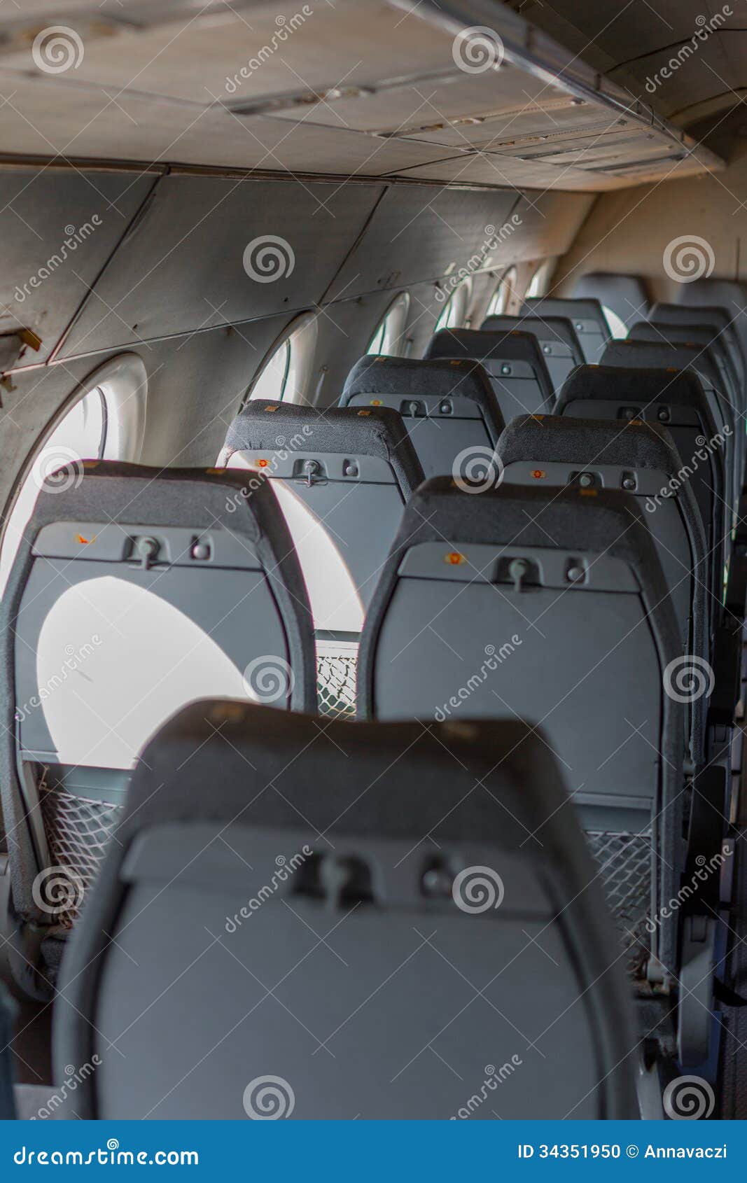 Airplane seats in a row stock photo. Image of people - 34351950