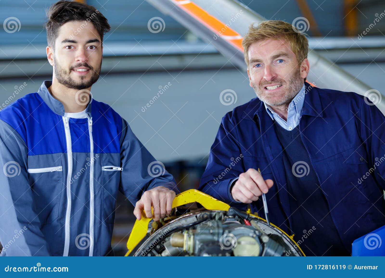 Airplane Service Crew Repairing Plane in Hangar Stock Image - Image of ...