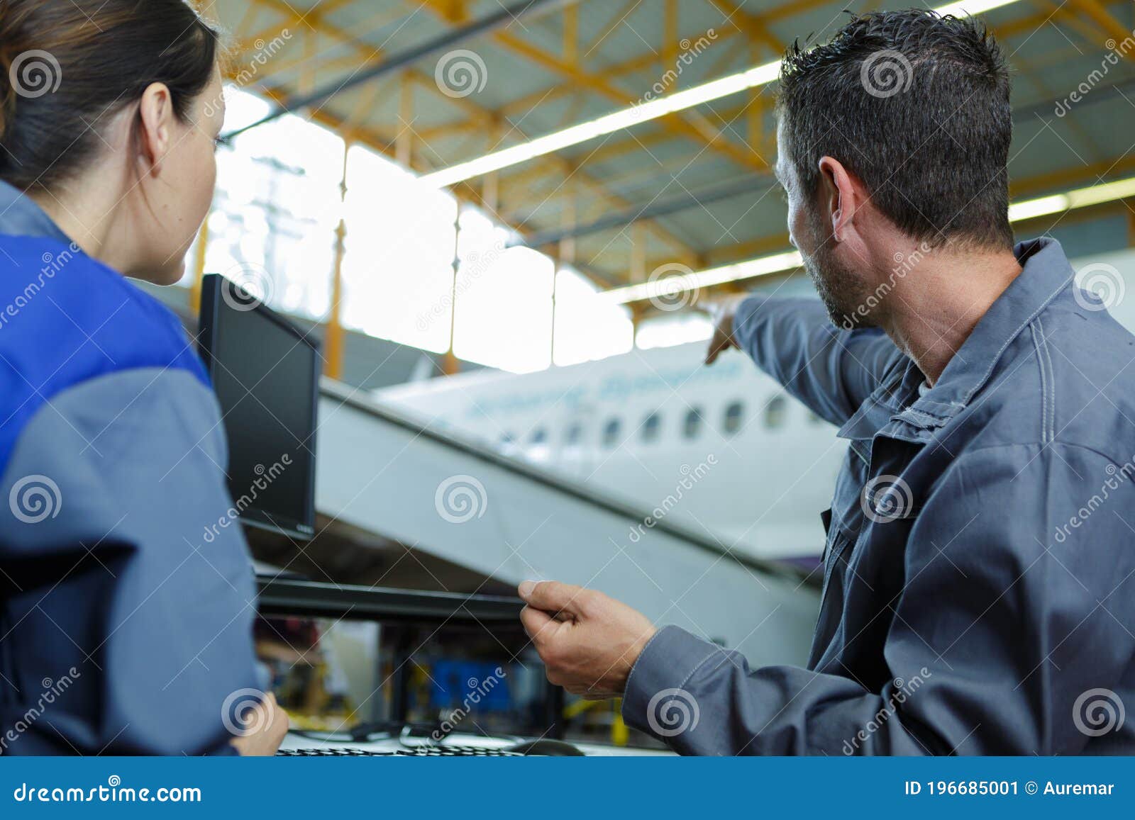 Airplane Service Crew Repairing Plane in Hangar Stock Image - Image of ...