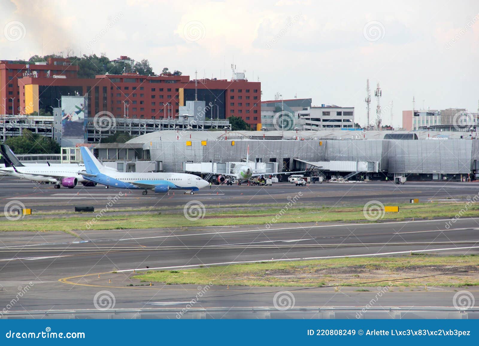 Airplane Settling on Runway To Take Off or Land Stock Image - Image of ...
