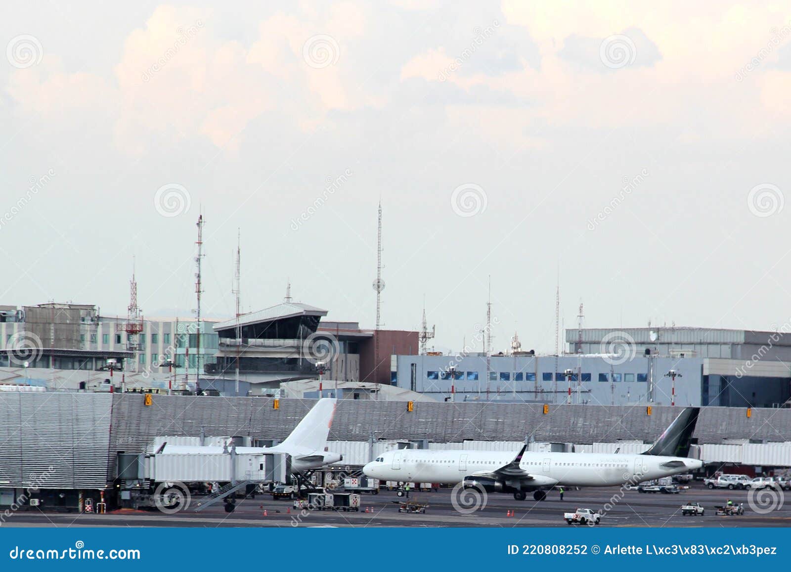 Airplane Settling on Runway To Take Off or Land Stock Photo - Image of ...