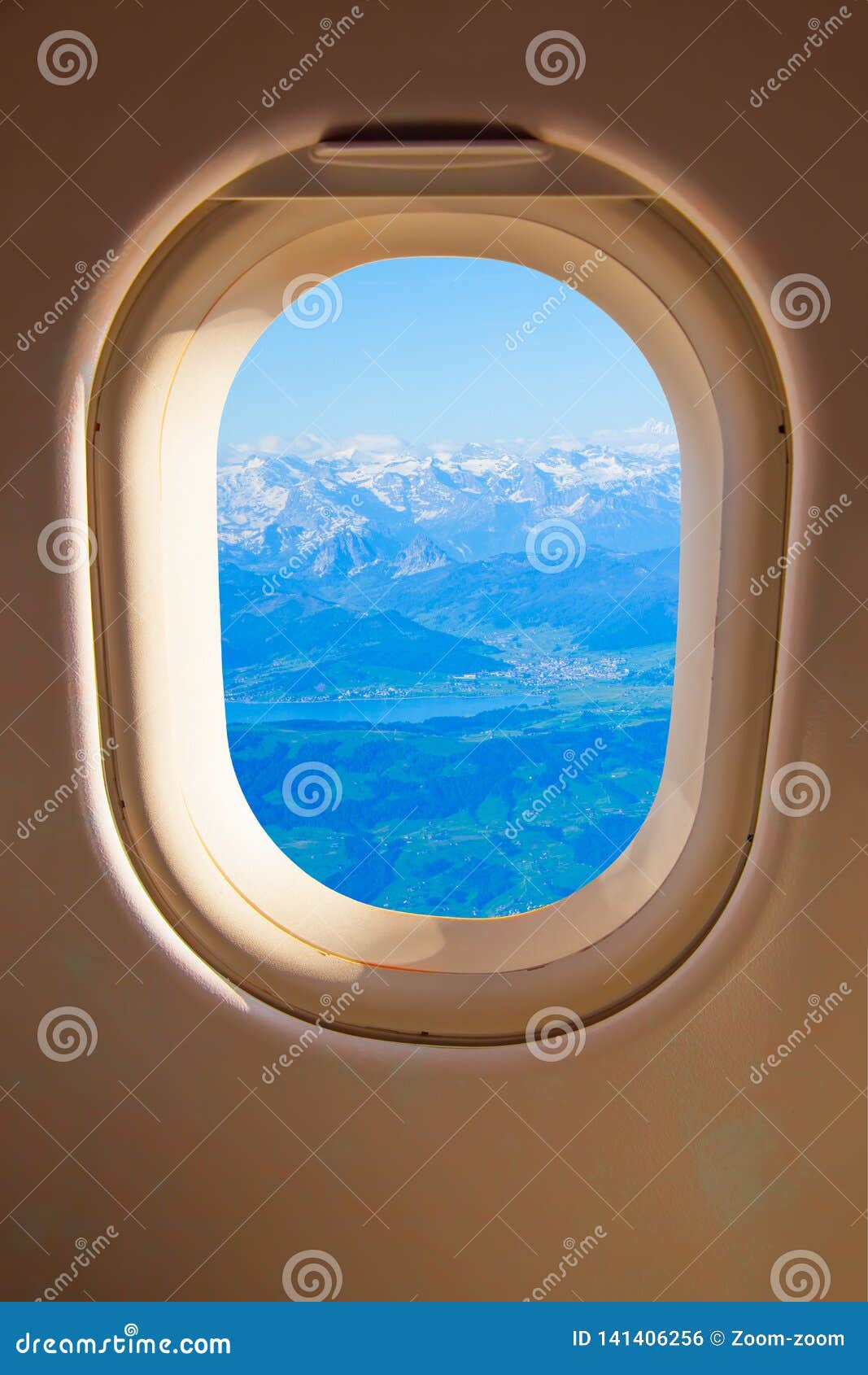 Airplane side window stock photo. Image of peaks, aerial - 141406256