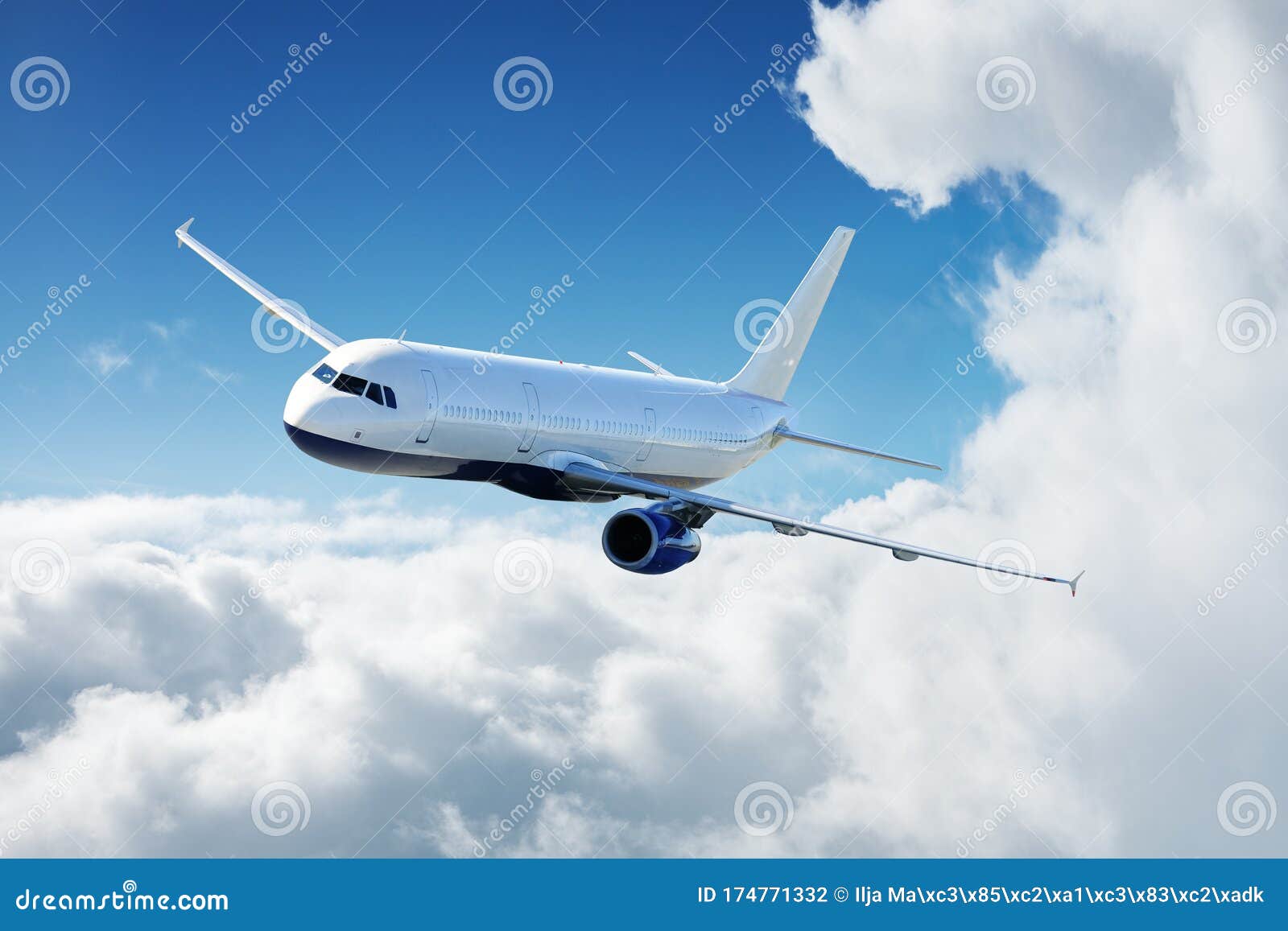 Airplane in the Sky Flying Above the Clouds at Sunny Day Stock Photo ...