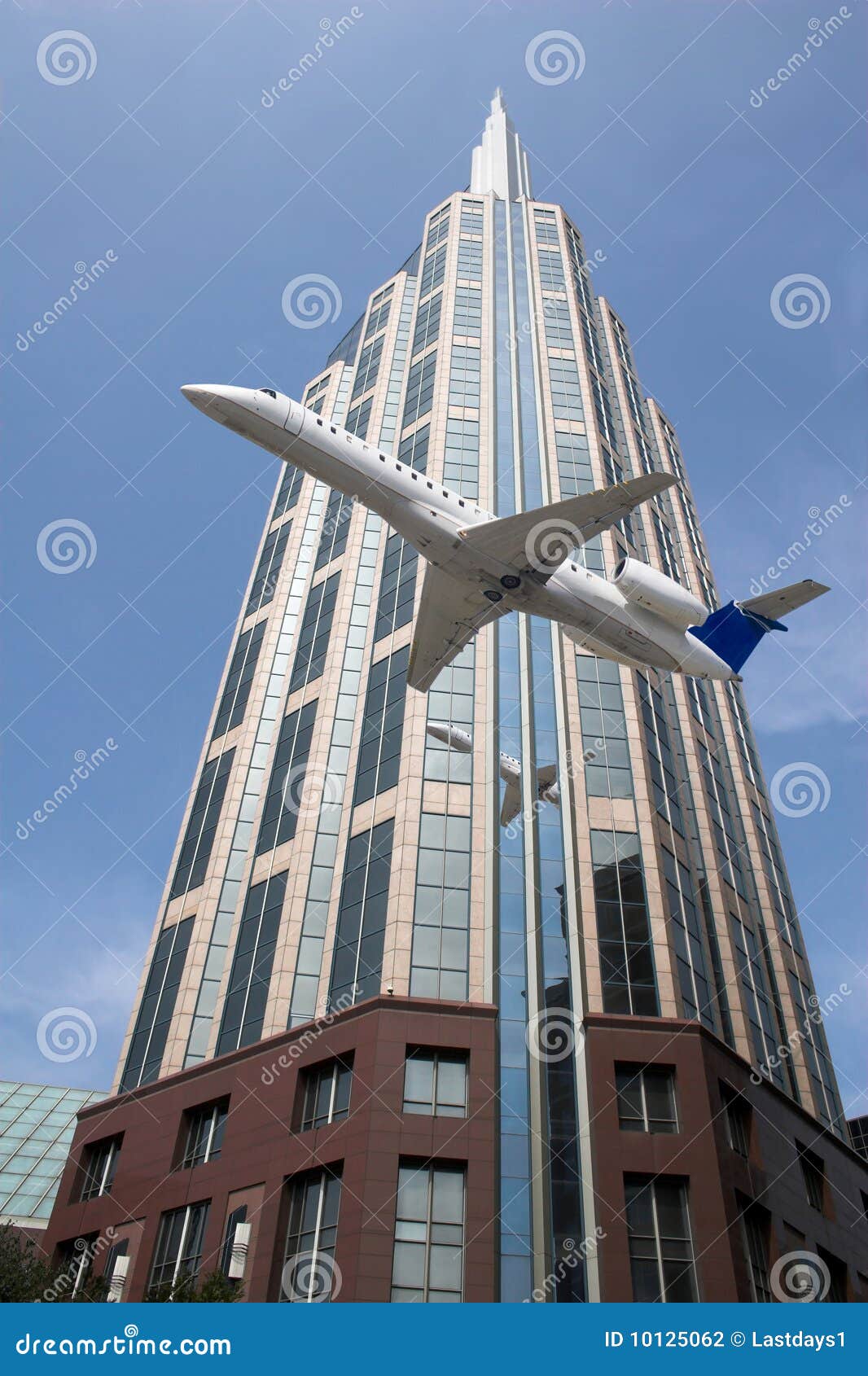 Airplane and Sky Scraper stock photo. Image of aviation - 10125062