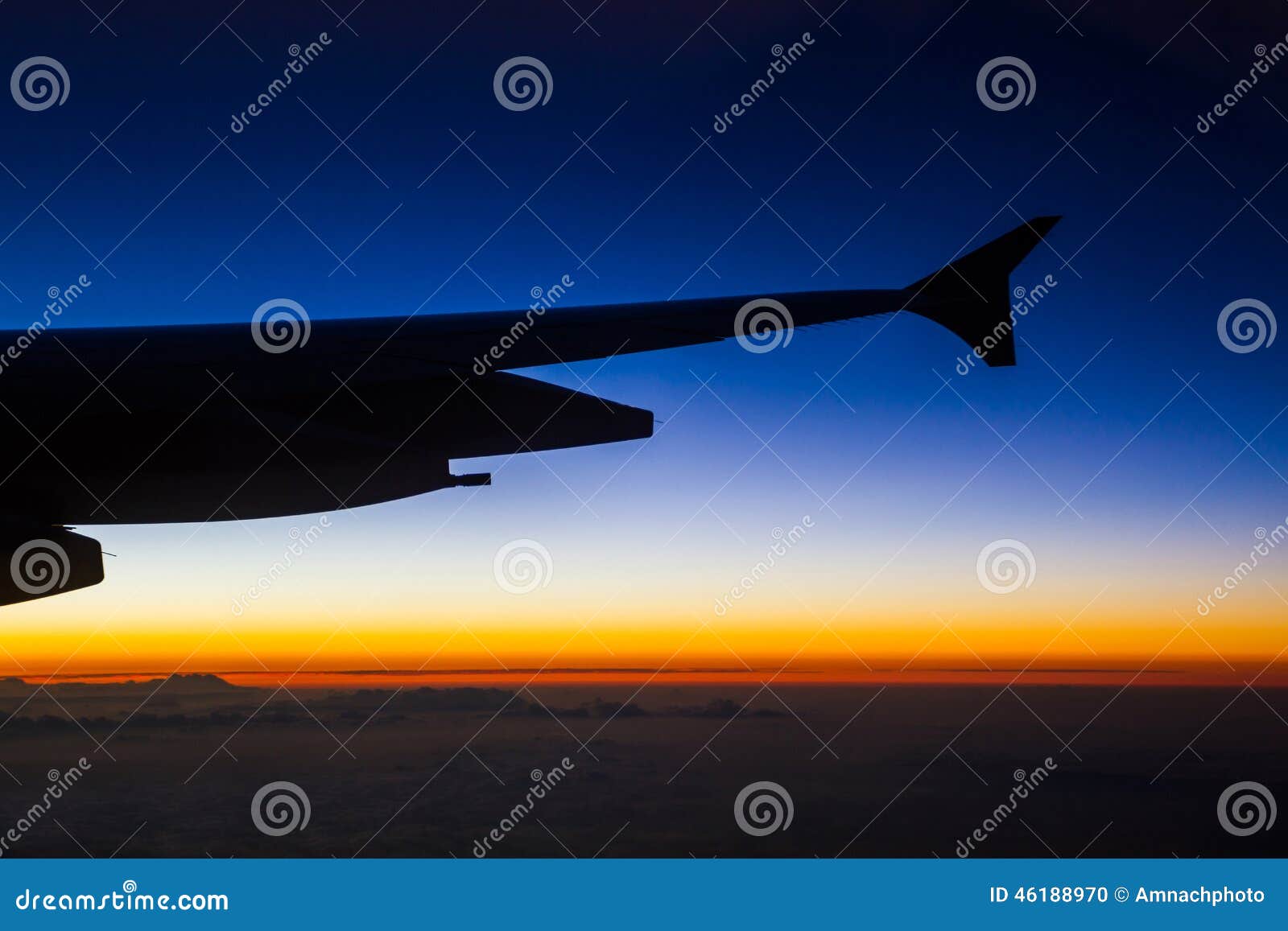 Airplane in the Sky with Skylines and Twilight . Stock Photo - Image of ...