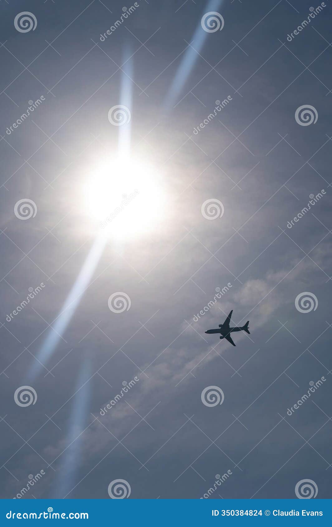 An Airplane in the Sky with Sun Stock Photo - Image of traffic, tourism ...