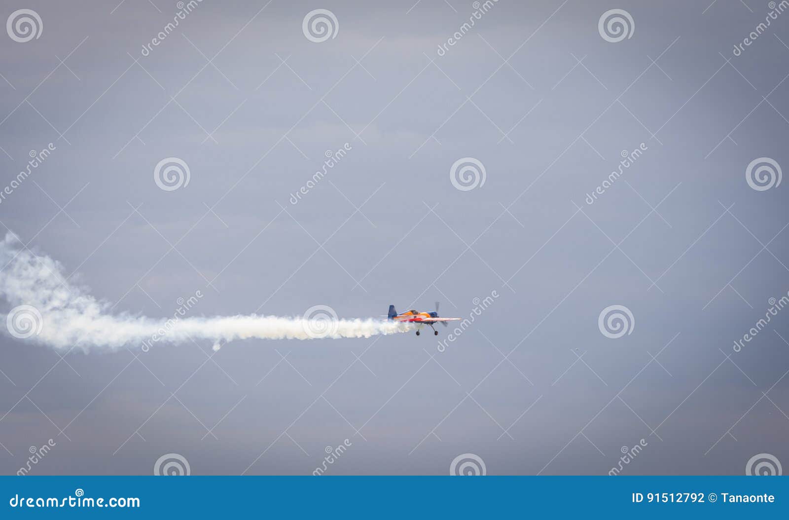 Airplane and Smoke in a Show Editorial Photography - Image of plane ...