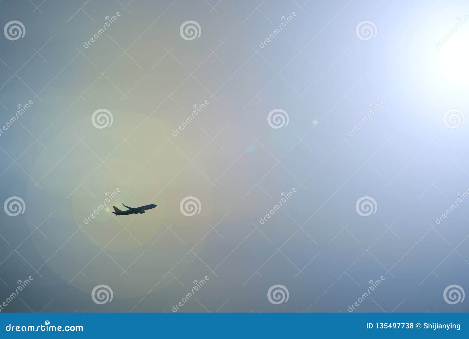 Airplane and sun stock photo. Image of skies, aeroplane - 135497738