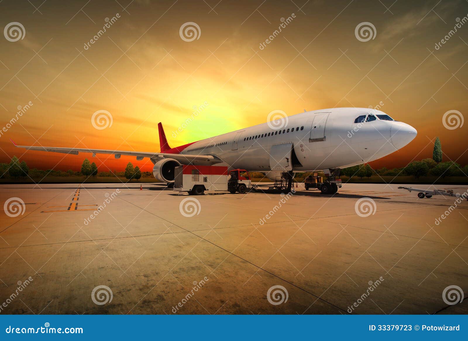 Airplane at sunset stock image. Image of illuminated - 33379723