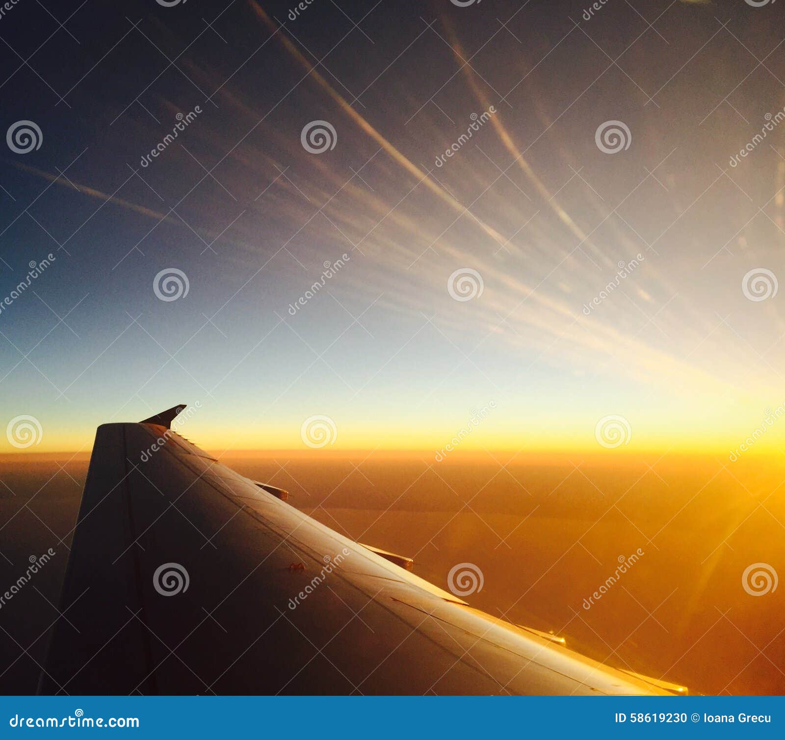 Airplane In The Air And Sunset Sky In Background Stock Photography ...