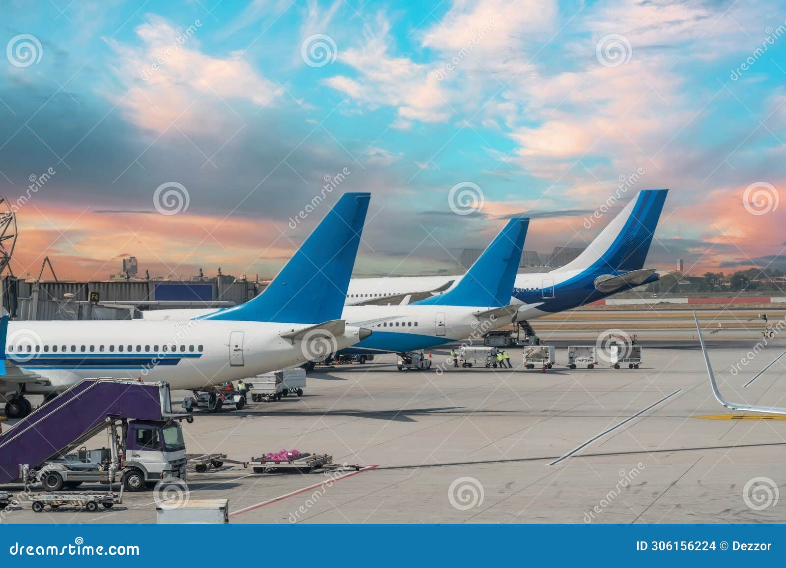 Airplane Tail View at Sunset at the Airport. Stock Photo - Image of ...