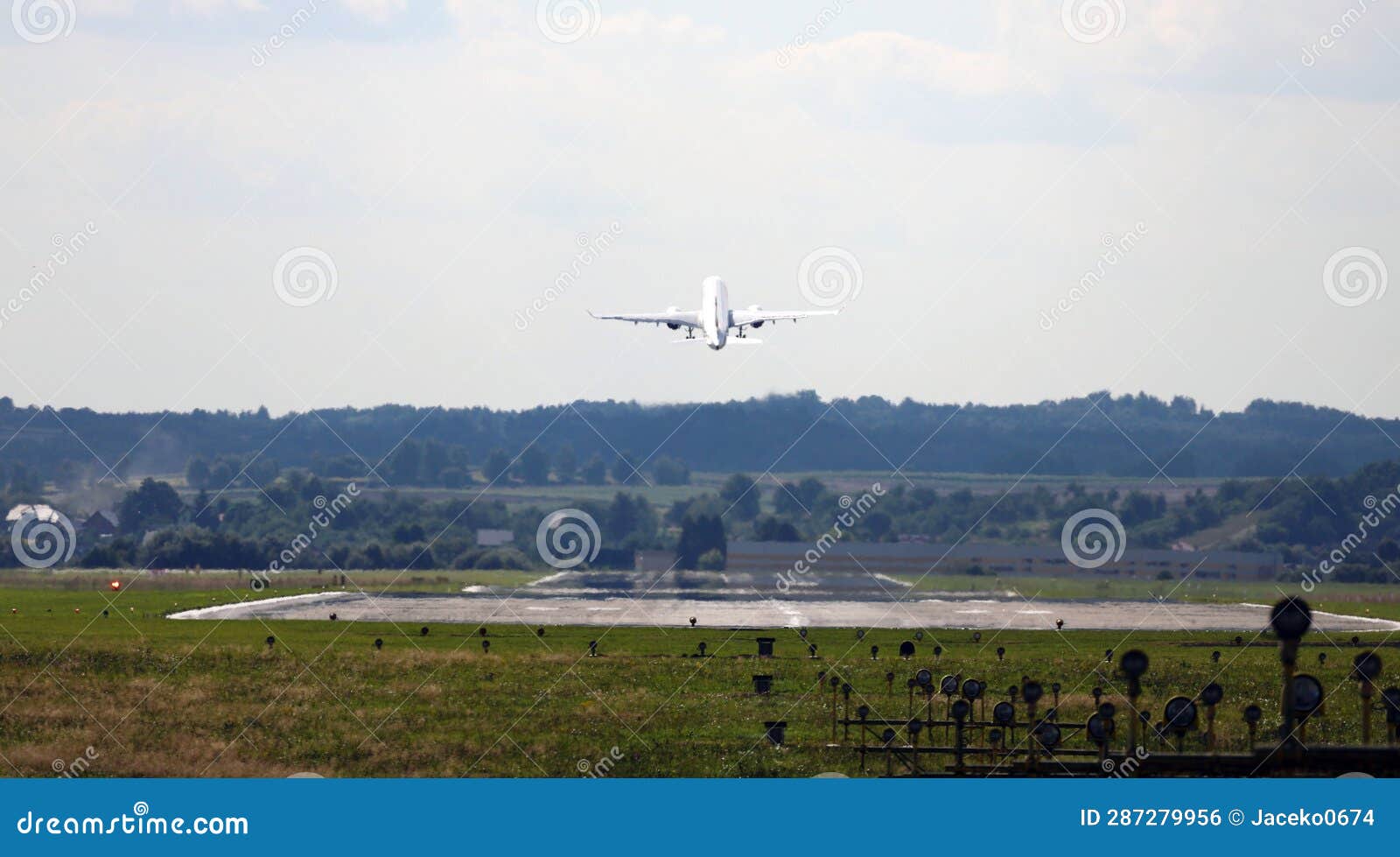 An Airplane Taking Off from the Runway. Stock Photo - Image of cargo ...