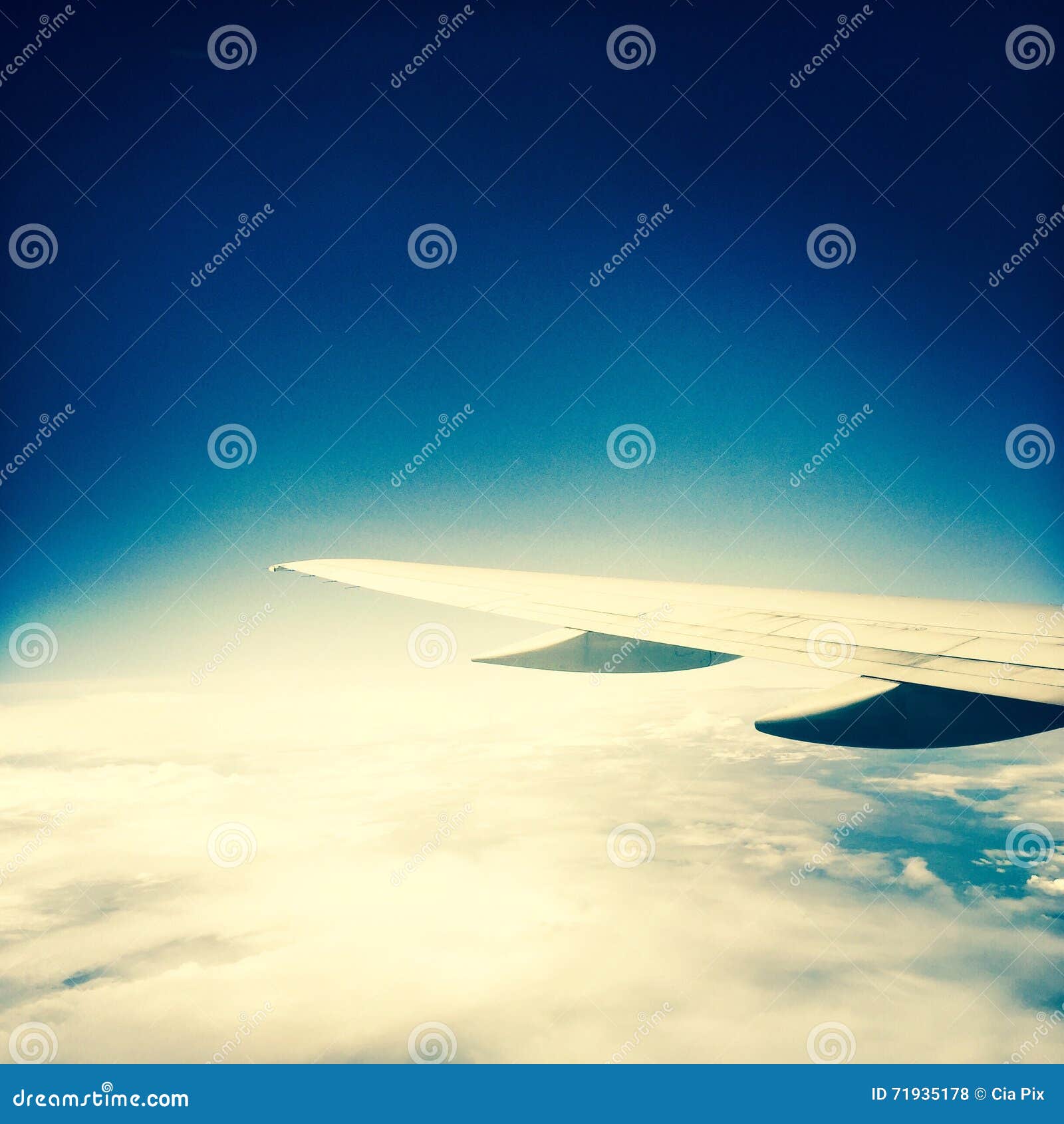 Airplane tip over clouds stock photo. Image of cloudy - 71935178