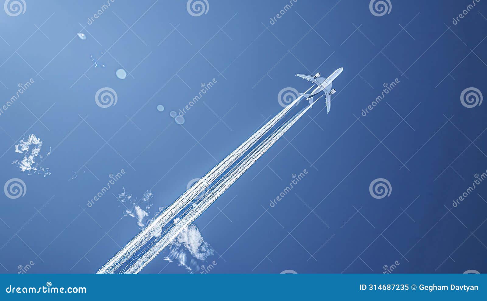Airplane Tracks in the Air, Blue Sky Background, Plane Tracks in the ...