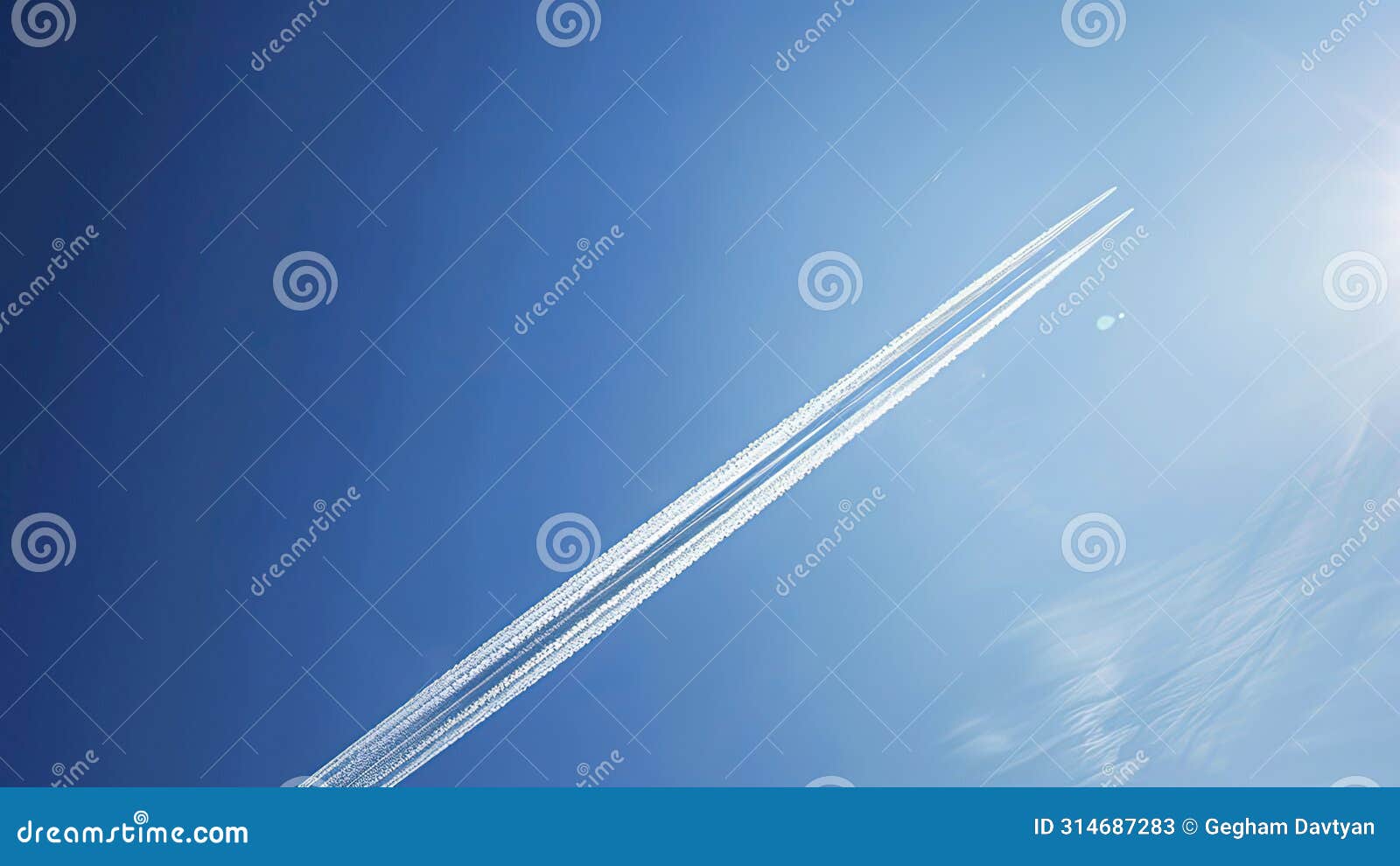 Airplane Tracks in the Air, Blue Sky Background, Plane Tracks in the ...