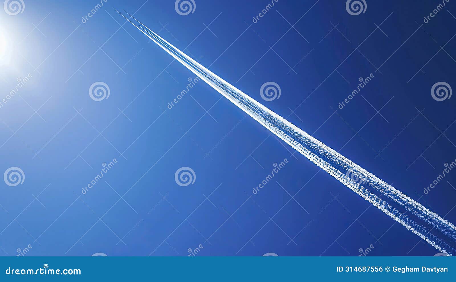 Airplane Tracks in the Air, Blue Sky Background, Plane Tracks in the ...