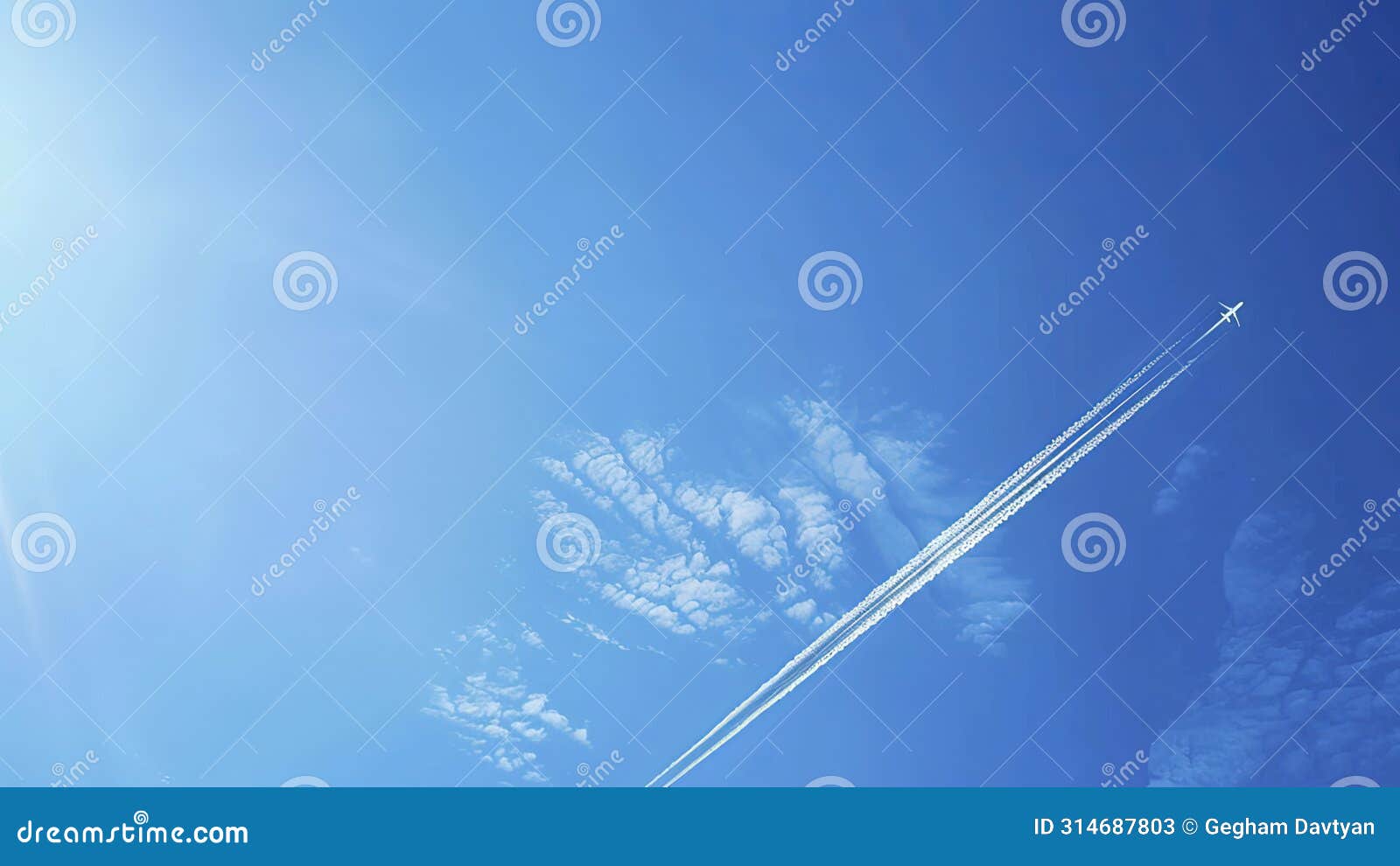 Airplane Tracks in the Air, Blue Sky Background, Plane Tracks in the ...